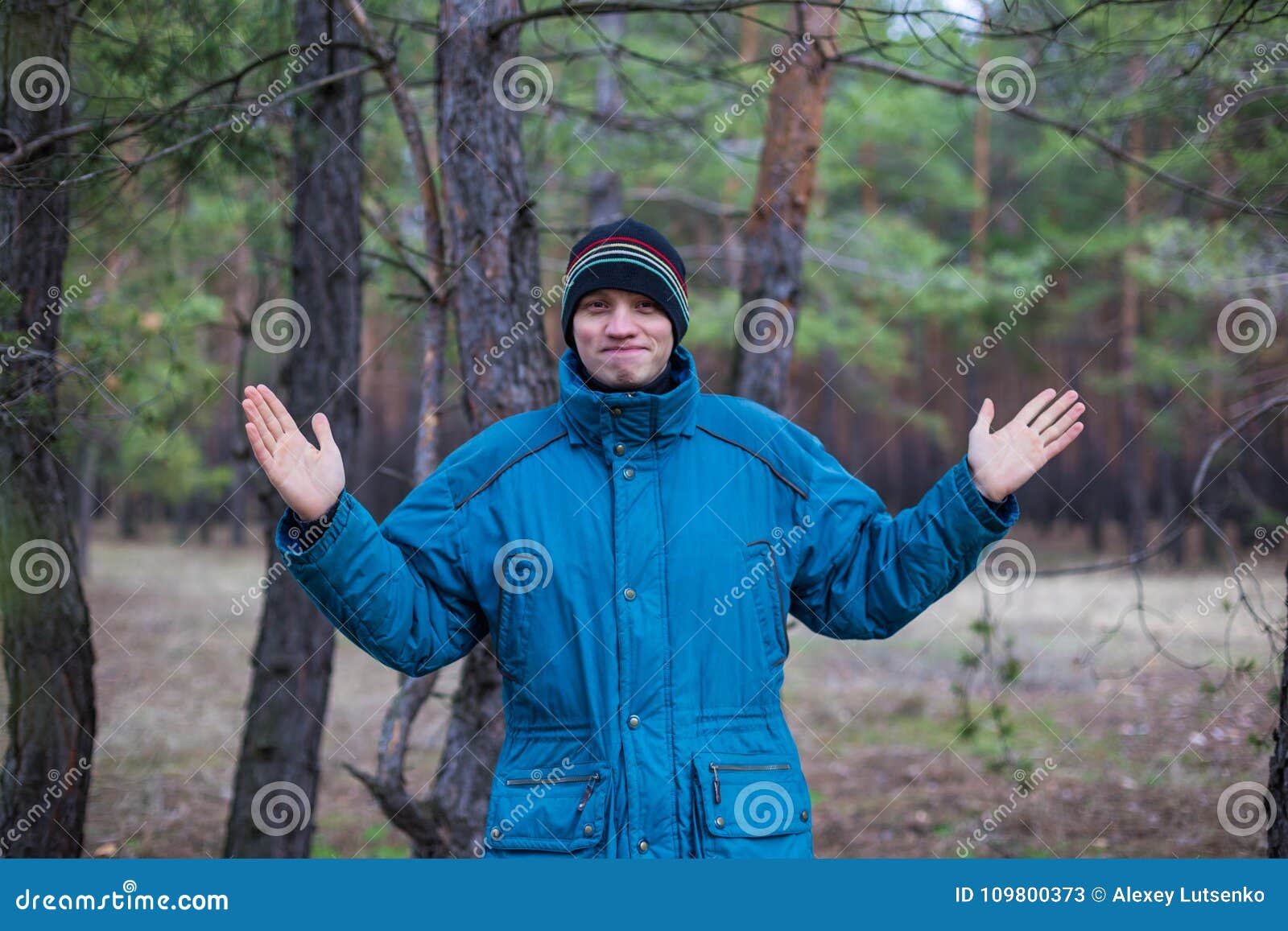 A Rural Guy Posing in a Pine Forest in the Autumn Time. Stock Image ...