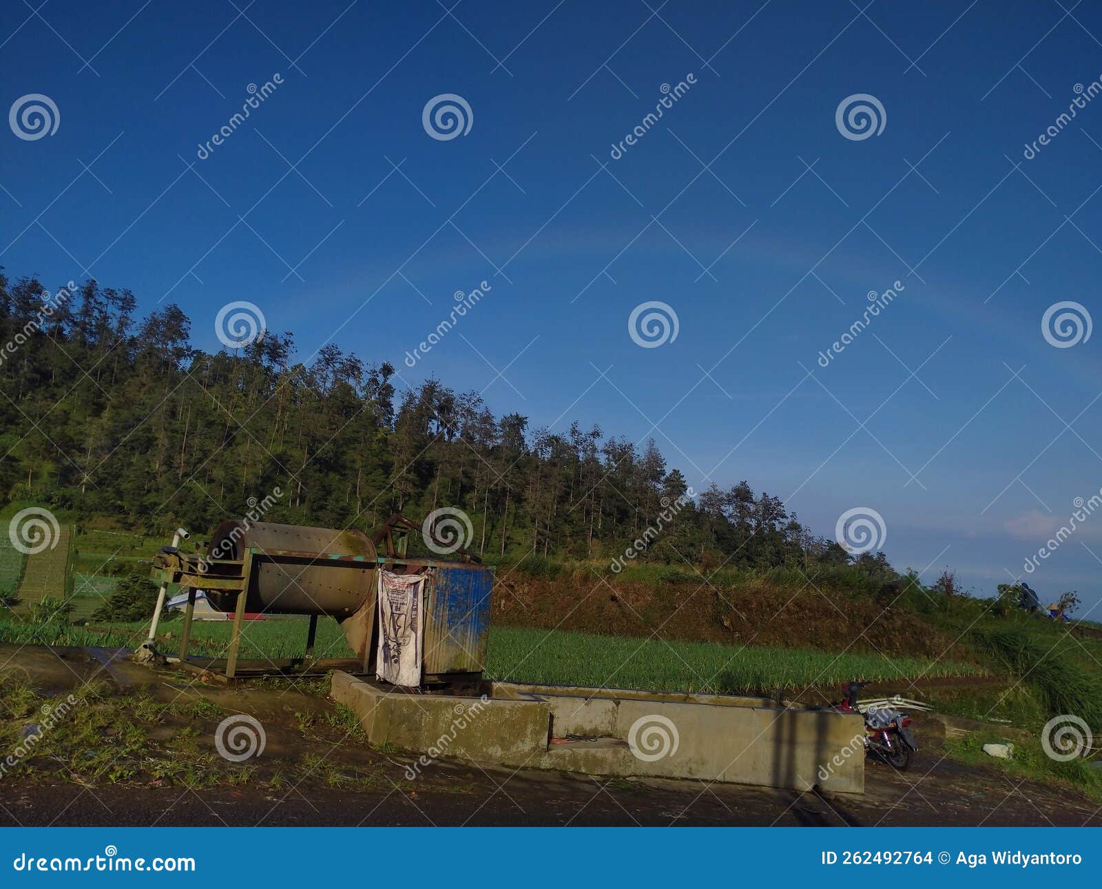 Rural industry stock photo. Image of tree, hill, horizon - 262492764