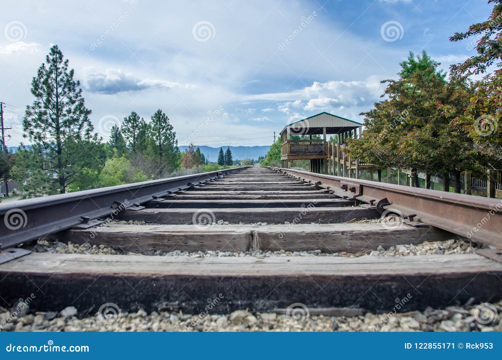 Rural Mountain Railroad Platform Waiting for Train and Passengers Stock ...