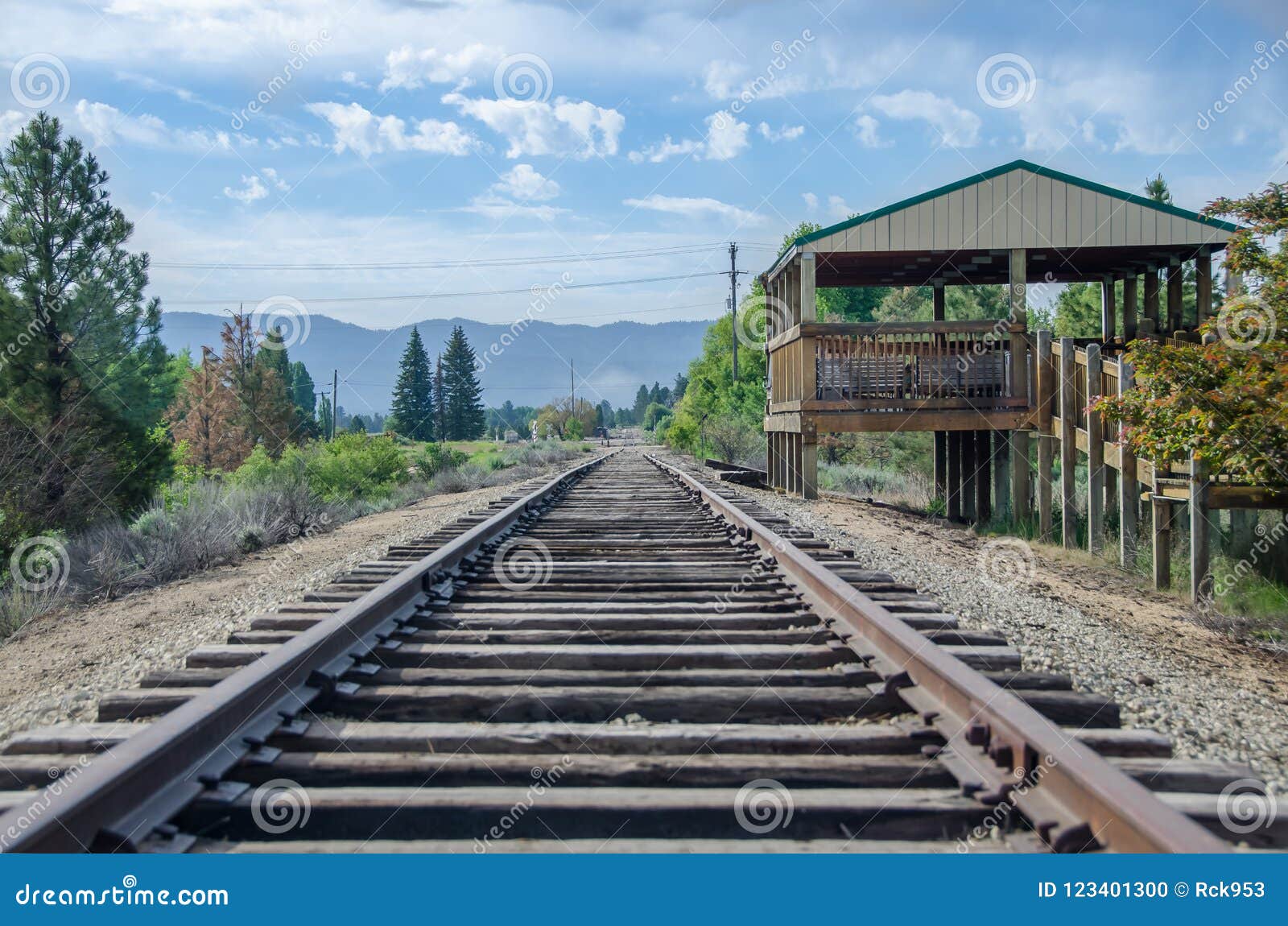 Rural Mountain Railroad Platform Waiting for Train and Passengers Stock ...