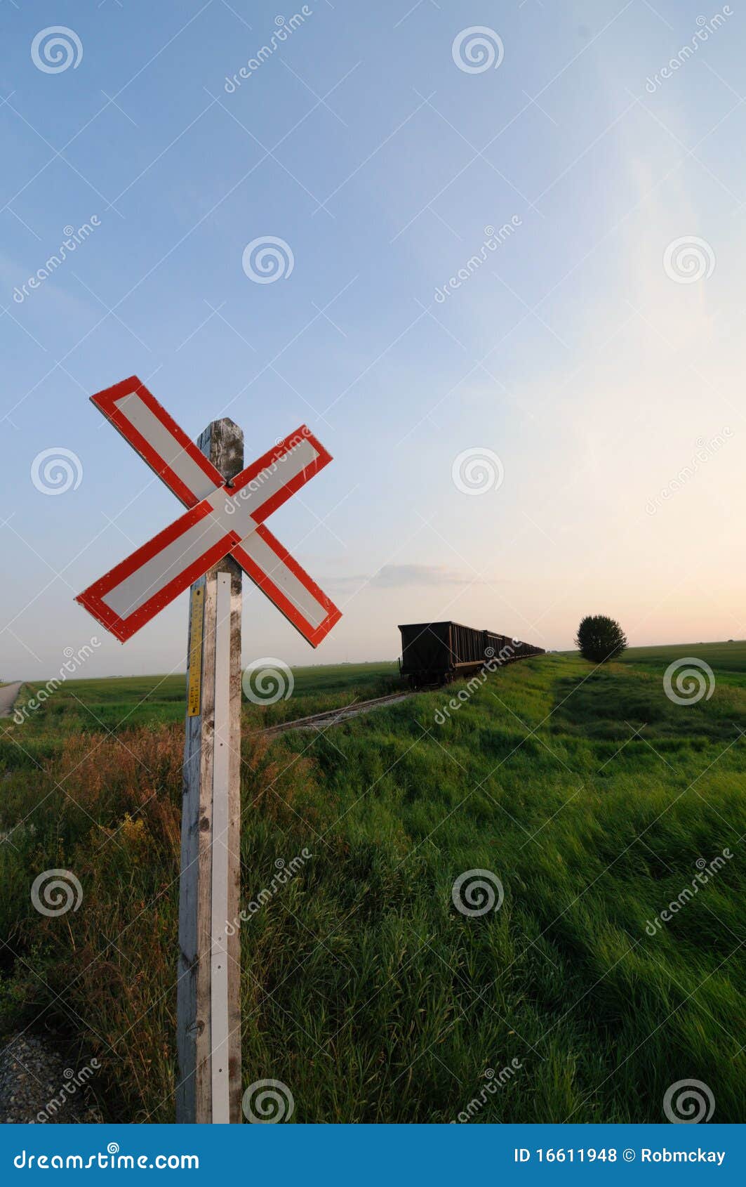 Rural Railroad Crossing Sign in the Prairies Stock Photo - Image of ...
