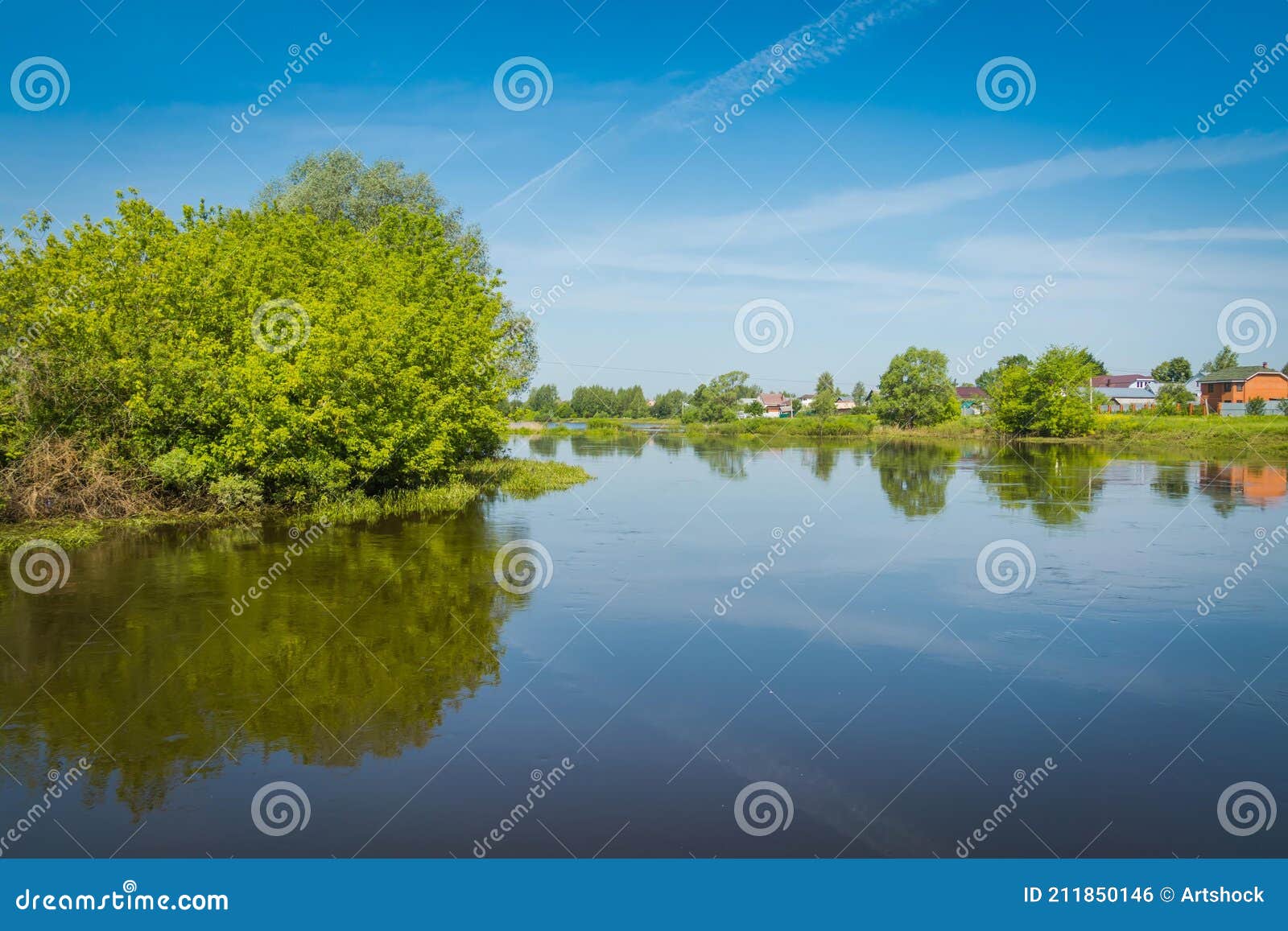 Rural river and blue sky stock photo. Image of meadow - 211850146