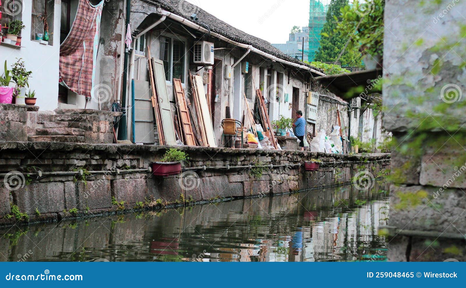 Rural slum near a lake editorial image. Image of dilapidated - 259048465