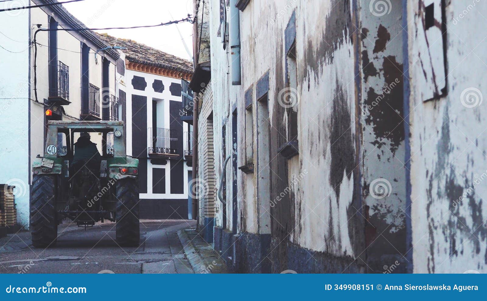 Rural Street with Tractor and Old Buildings Stock Image - Image of ...