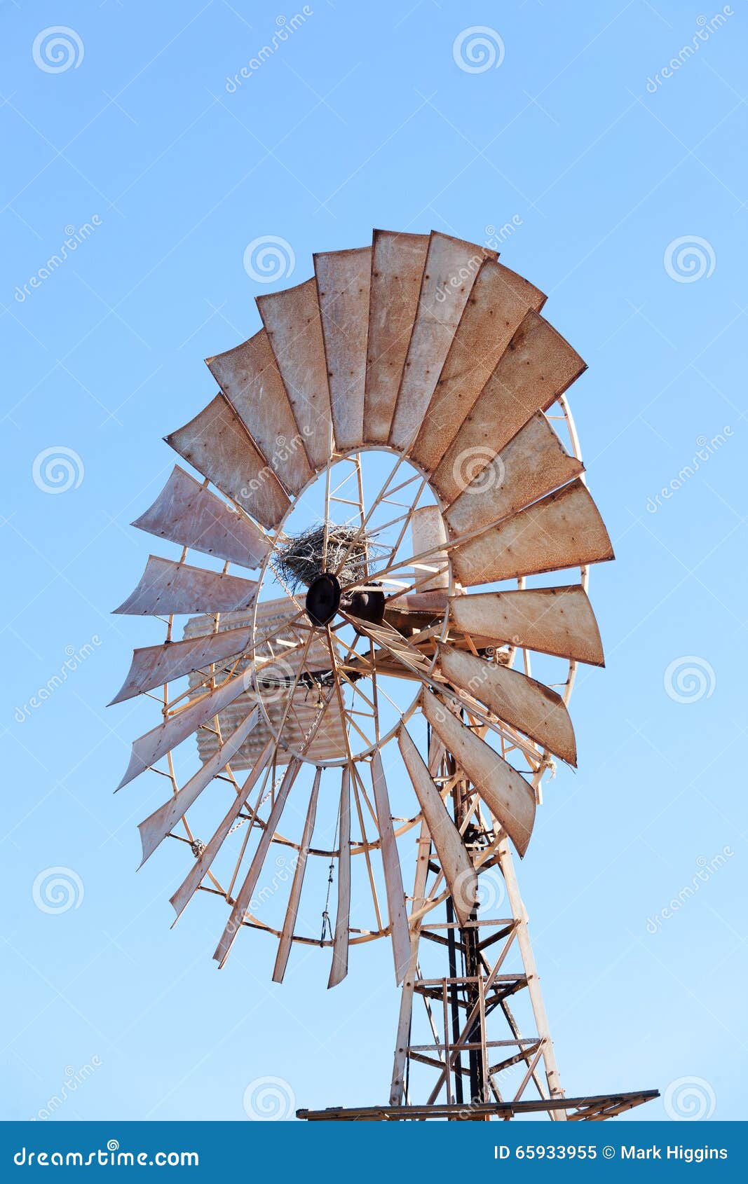 Rural windmill stock image. Image of scene, rural, river - 65933955