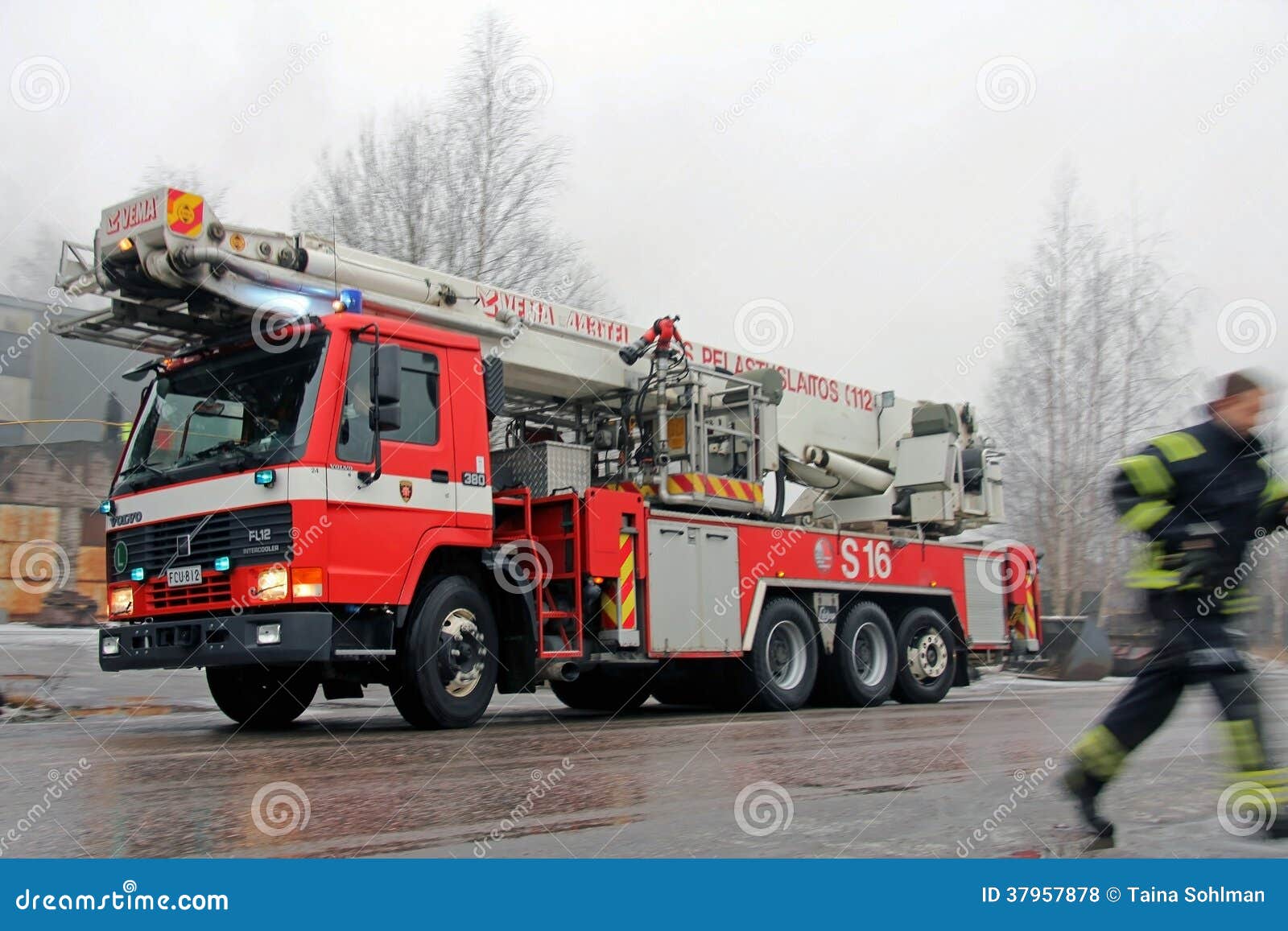 Rushed Fireman and Volvo FL12 Fire Engine Arriving at Fire Scene ...