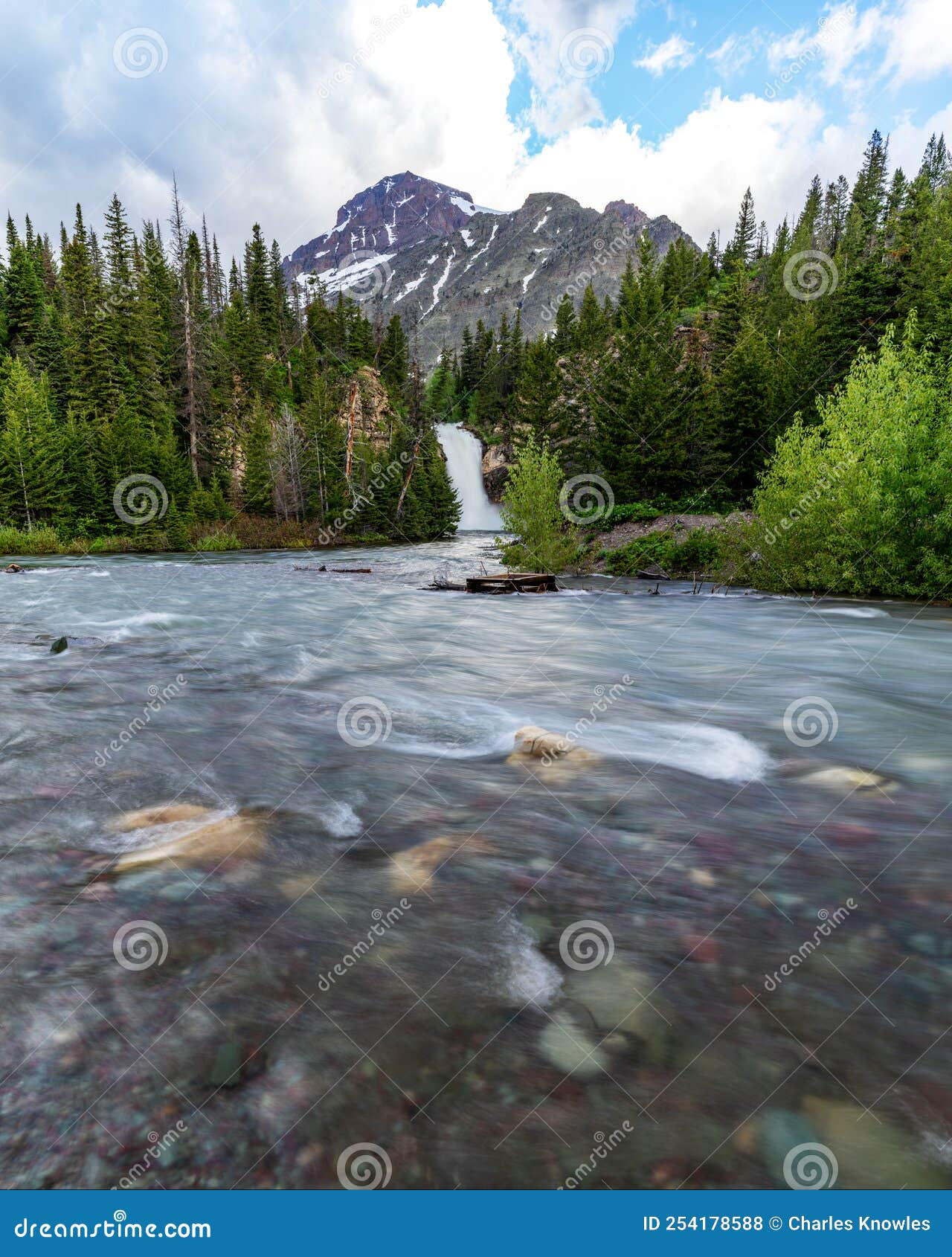Rushing Raging River and Distant Waterfall Stock Photo - Image of ...