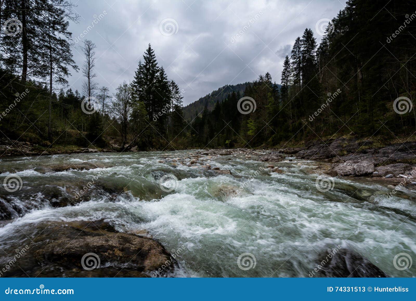 Rushing River Over Rocks in Forest with Mountains in Tirol, Austria ...