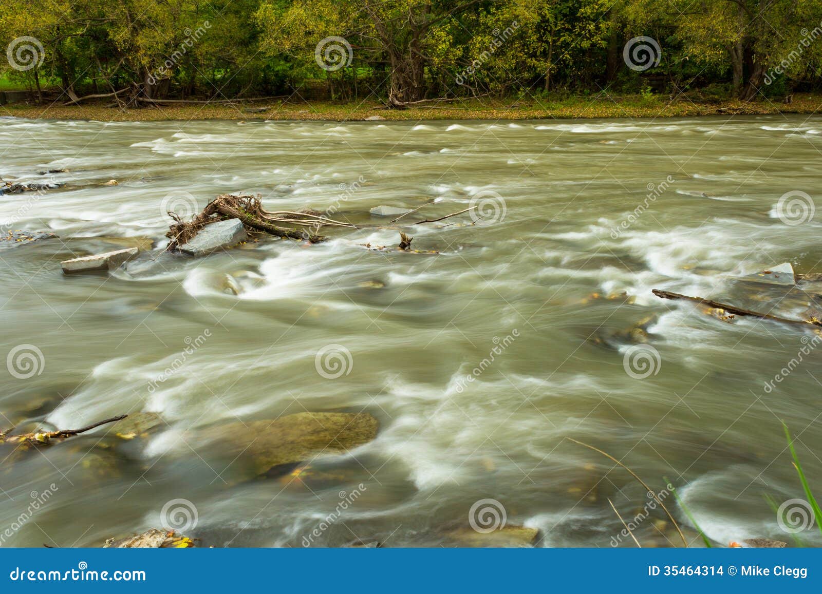 Rushing water on a river stock photo. Image of afternoon - 35464314
