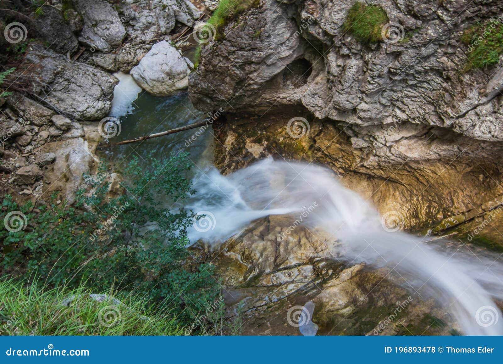 Rushing Waterfall with Rocks in the Mountains Stock Photo - Image of ...