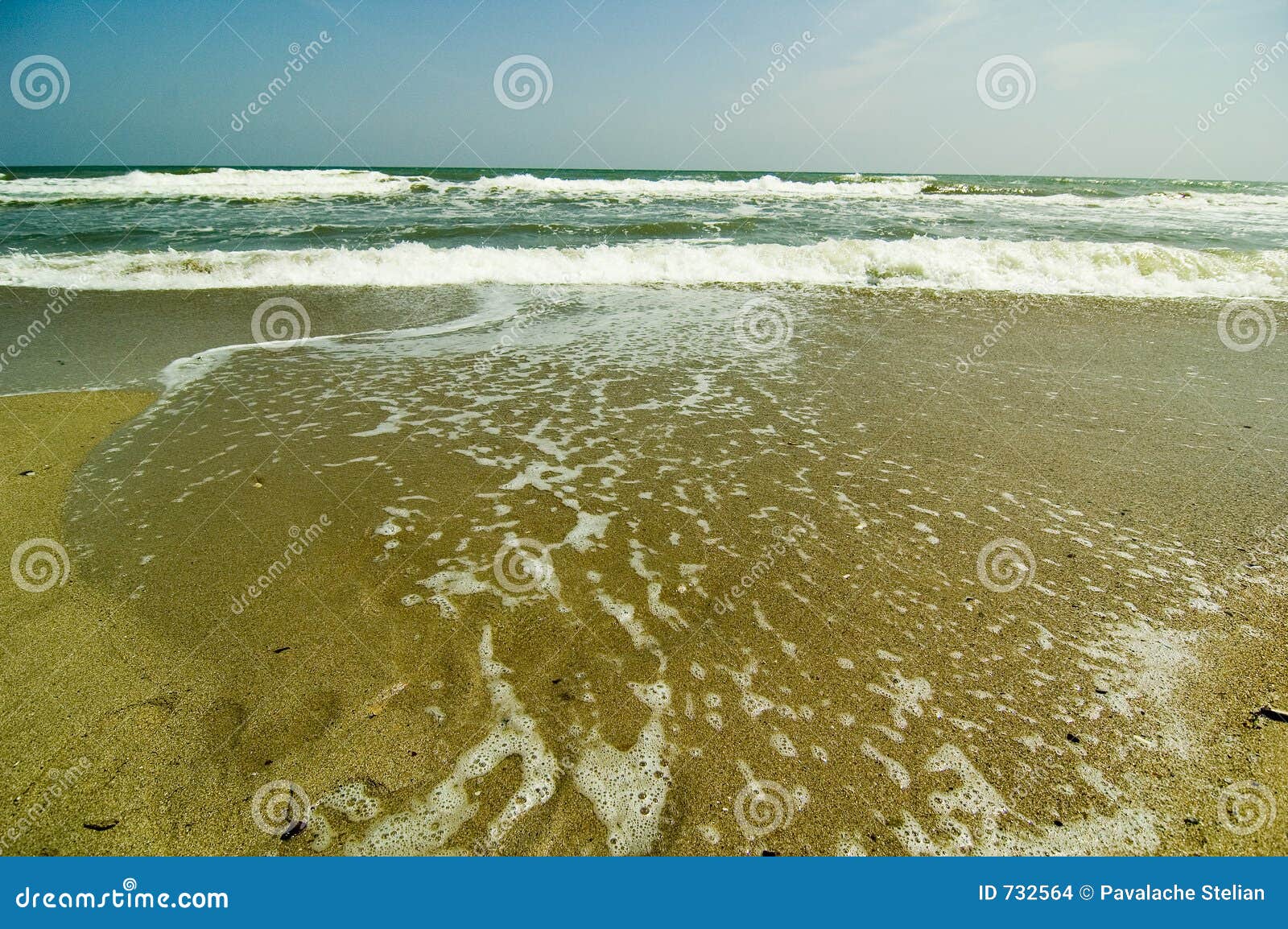 Rushing Waves on a Sandy Beach. Stock Photo - Image of horizon ...
