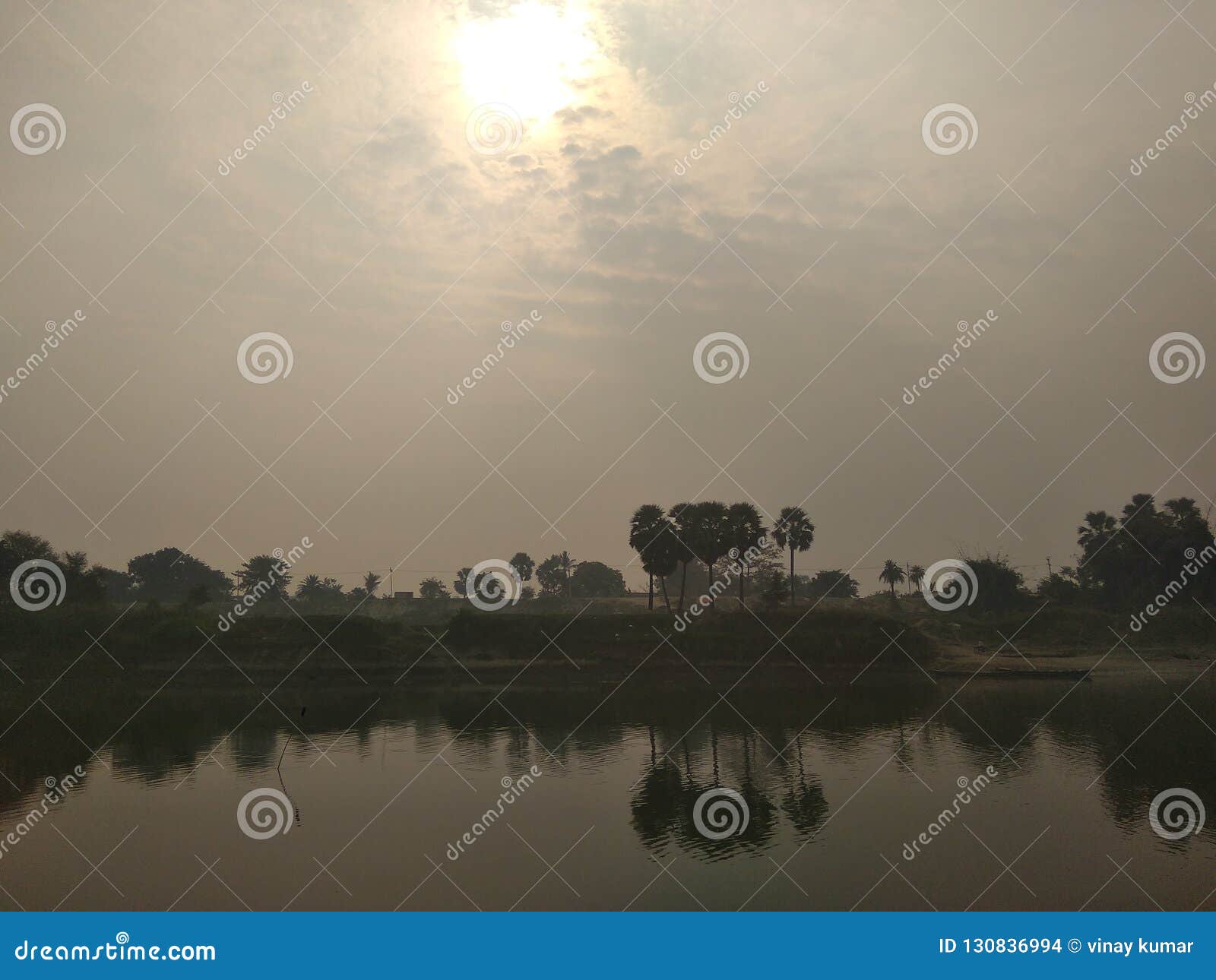 Rising sun stock photo. Image of water, shadow, river - 130836994