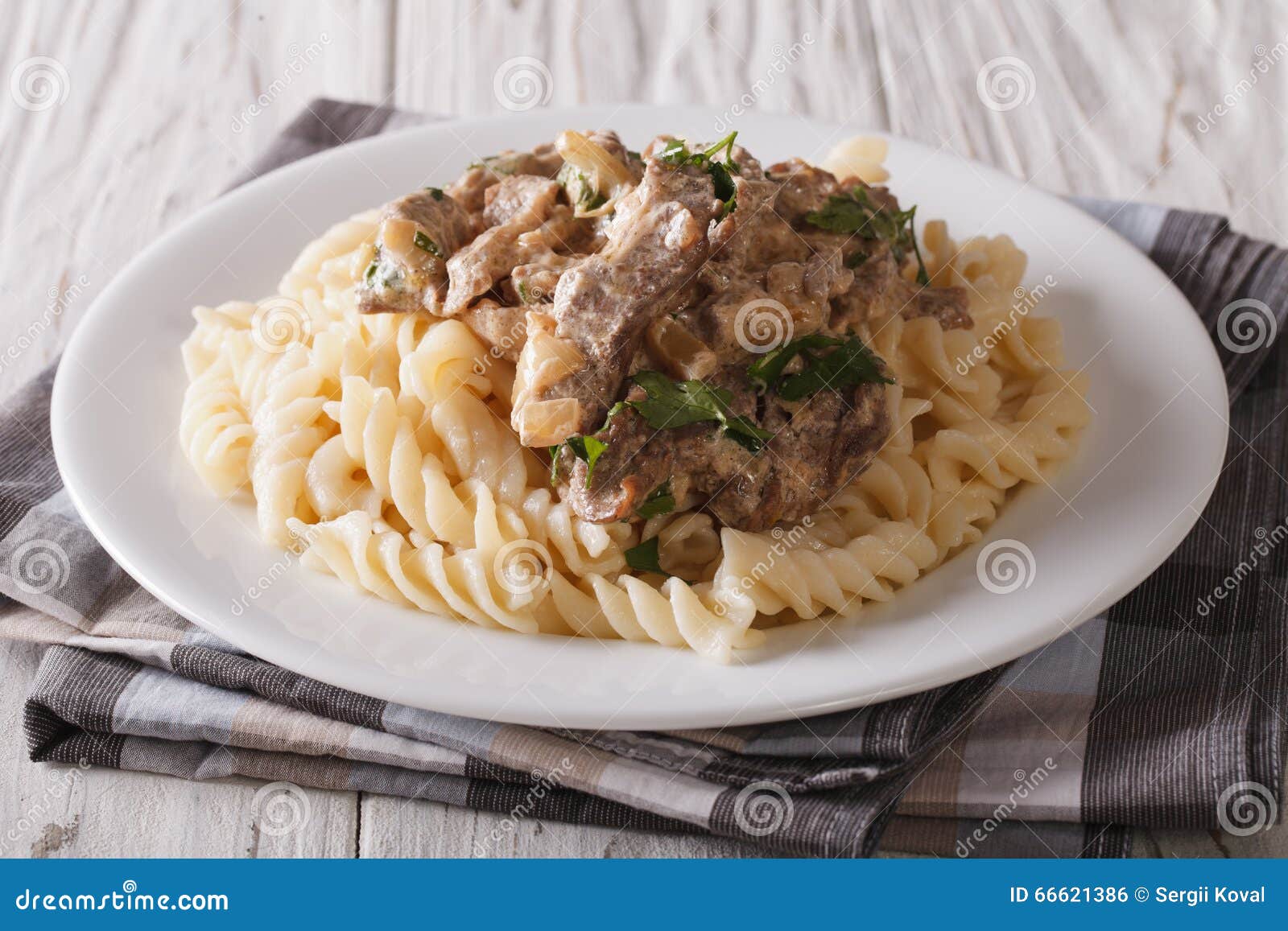 Russian Beef Stroganoff with Pasta Fusilli Closeup on a Plate. H Stock ...