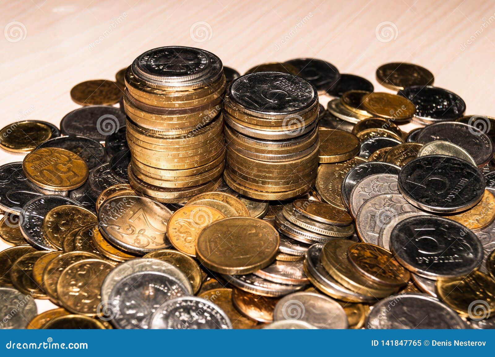 Russian Coins of Different Denominations are in a Heap on the Table ...