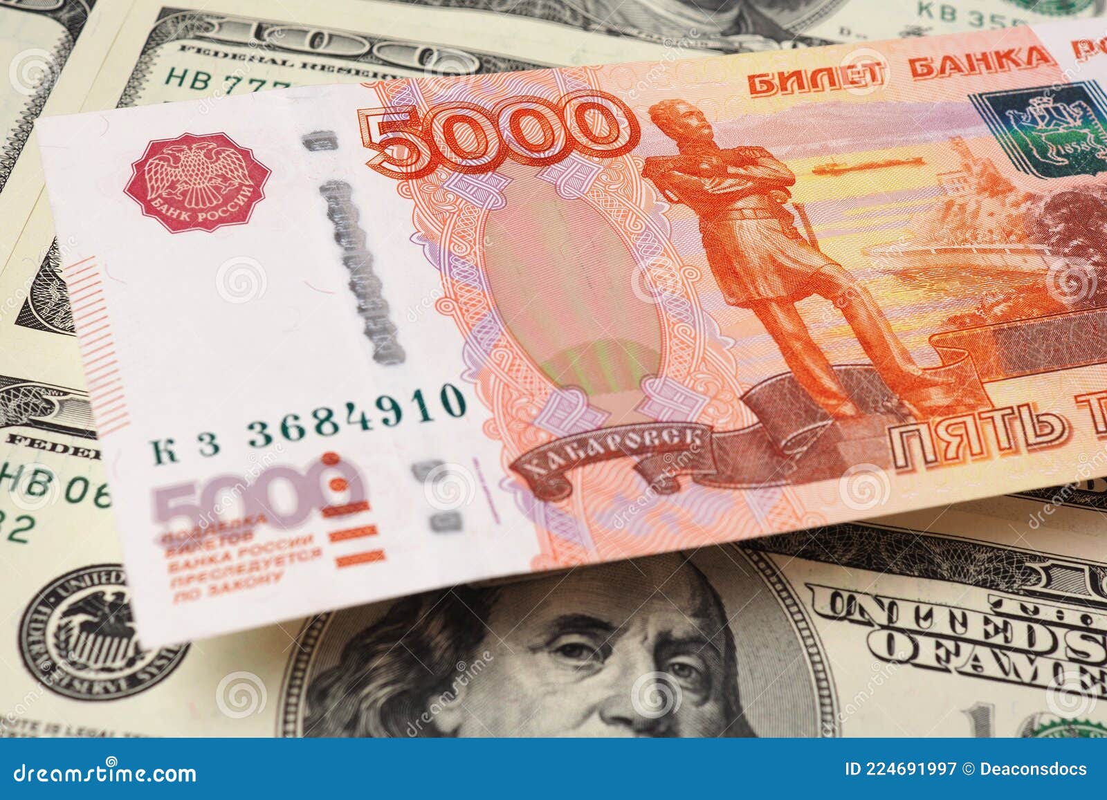 Russian Denomination of 5,000 Rubles Over a Field of $ 100 Bills Stock ...