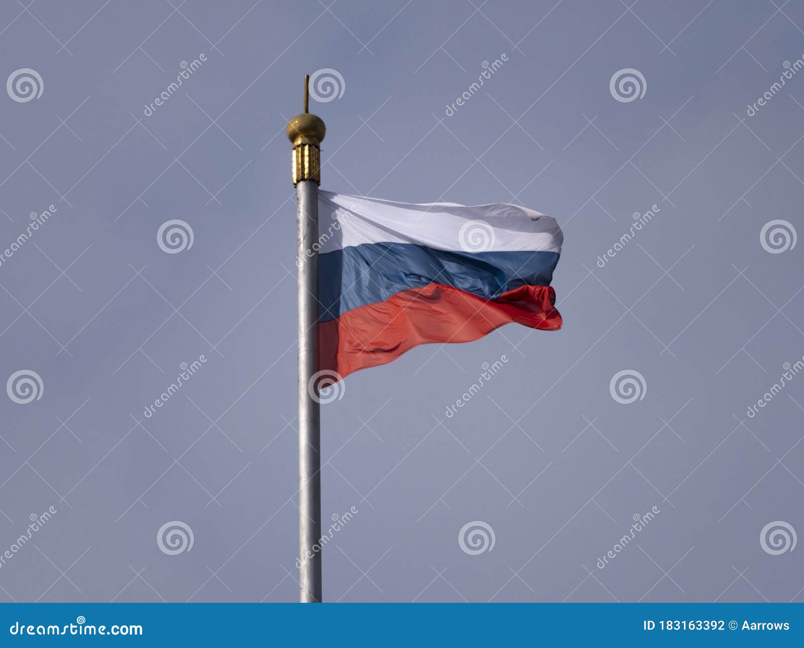 Russian Flag Fluttering in the Wind on a Flagpole Stock Photo - Image ...