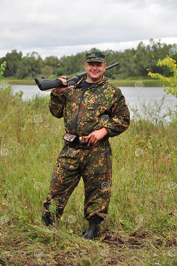 Russian Hunter stock photo. Image of deer, pointing, leaves - 26466866