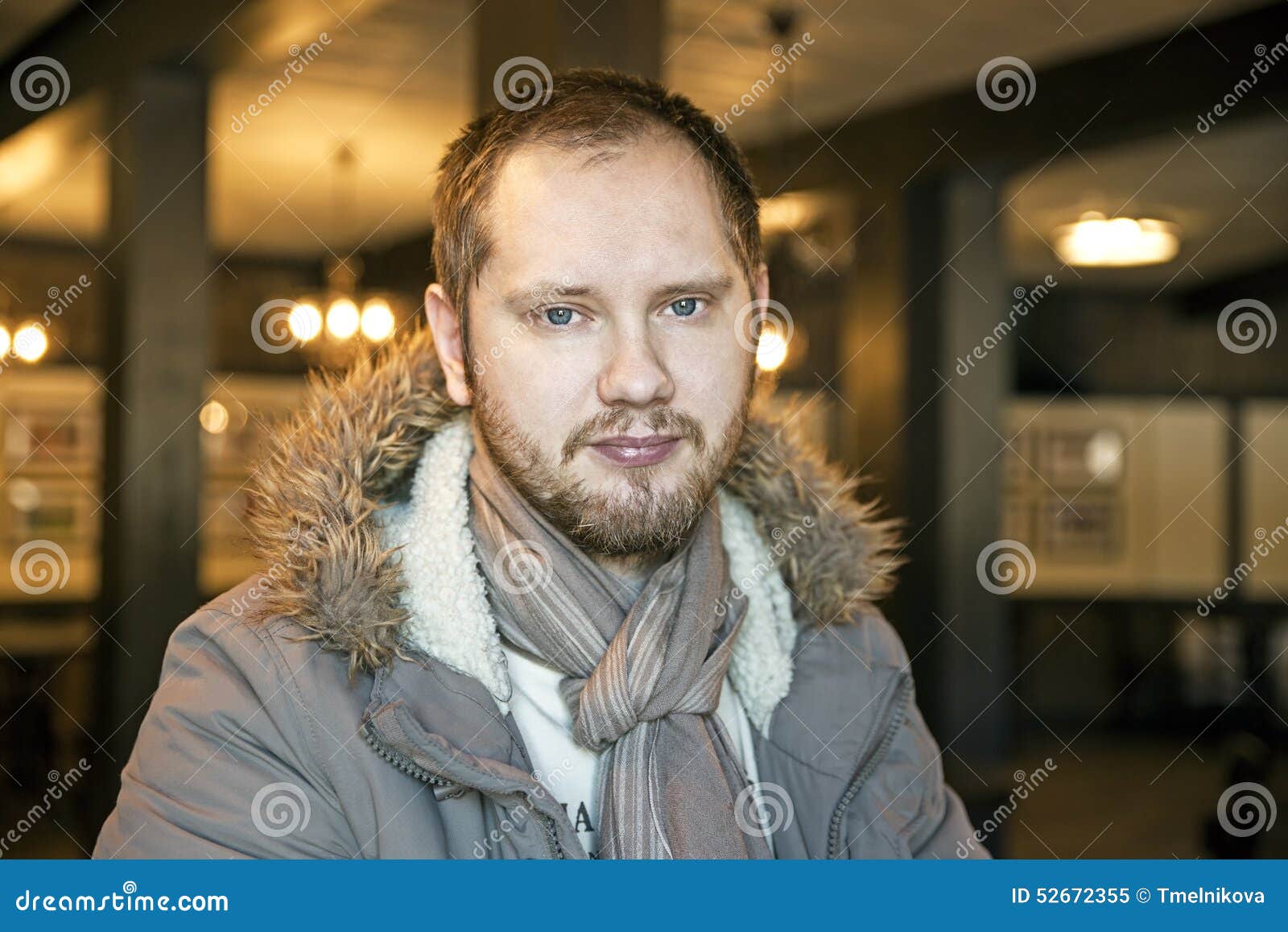 Russian Man with Beard Sitting Inside in a Coat Stock Image - Image of ...