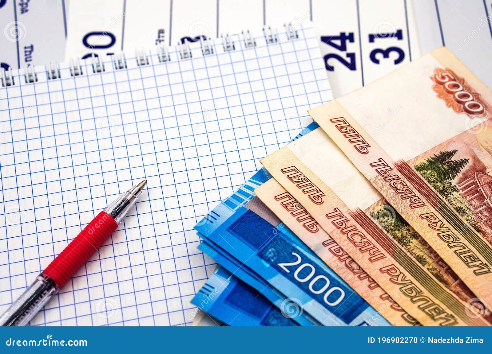 Russian Money and a Notepad, a Red Pen and Russian Banknotes, a Clean ...
