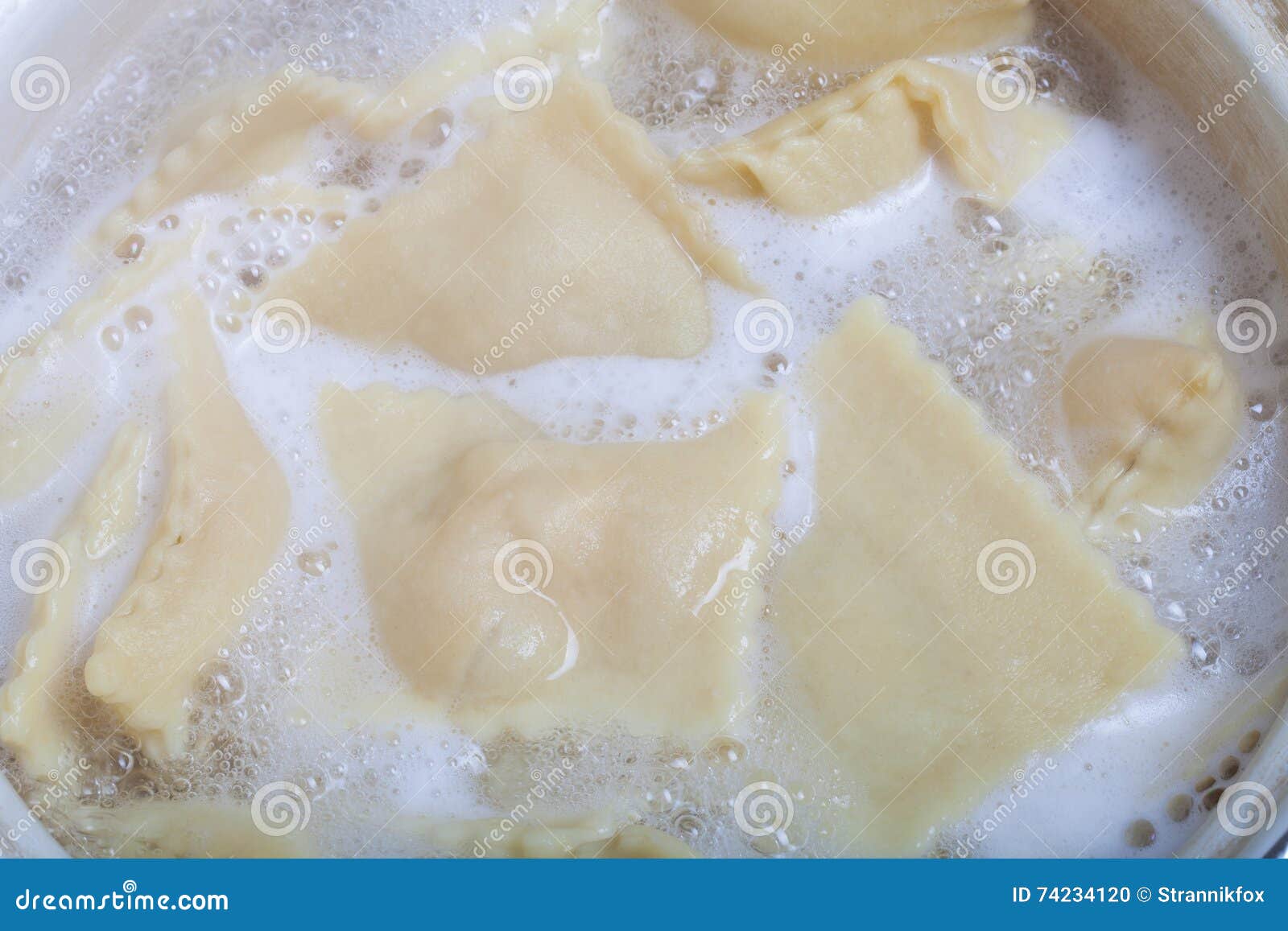 Russian Ravioli - Pelmeni are Boiling in Broth . Cooking Process Stock ...