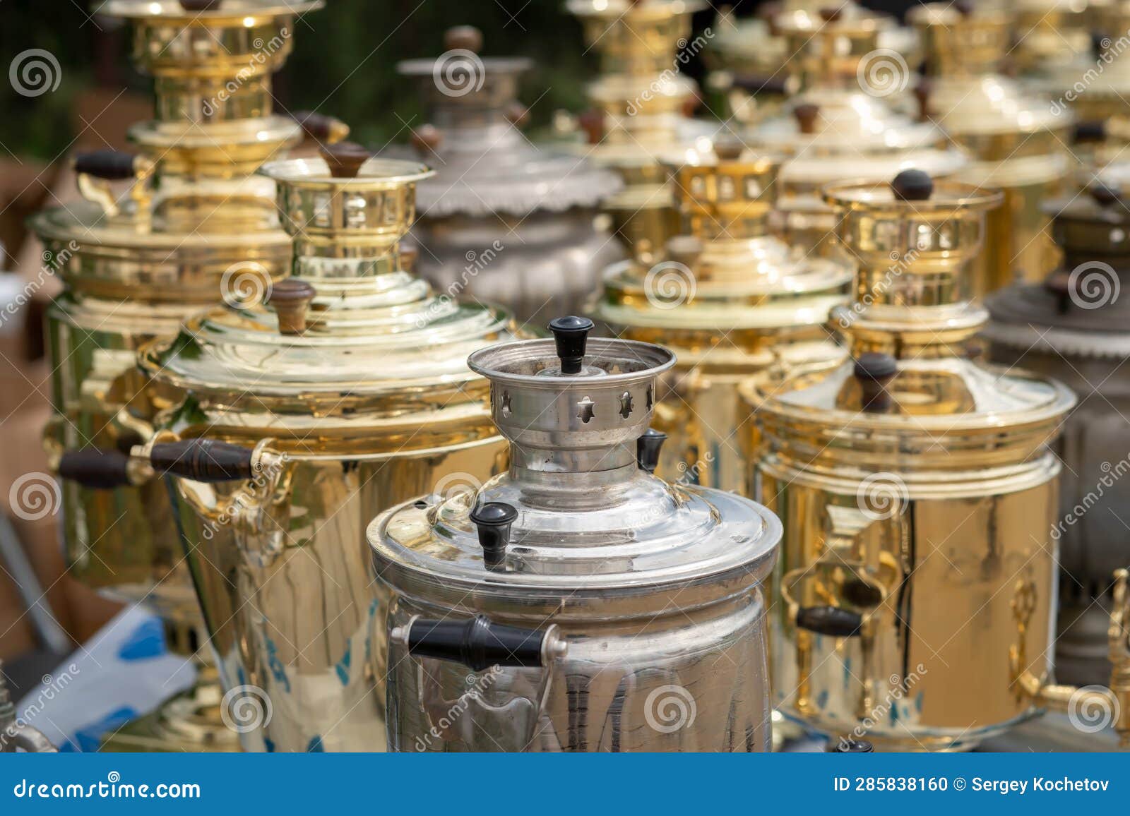 Russian Samovars Stand on the Table for Sale. Bronze Samovar. Stock ...