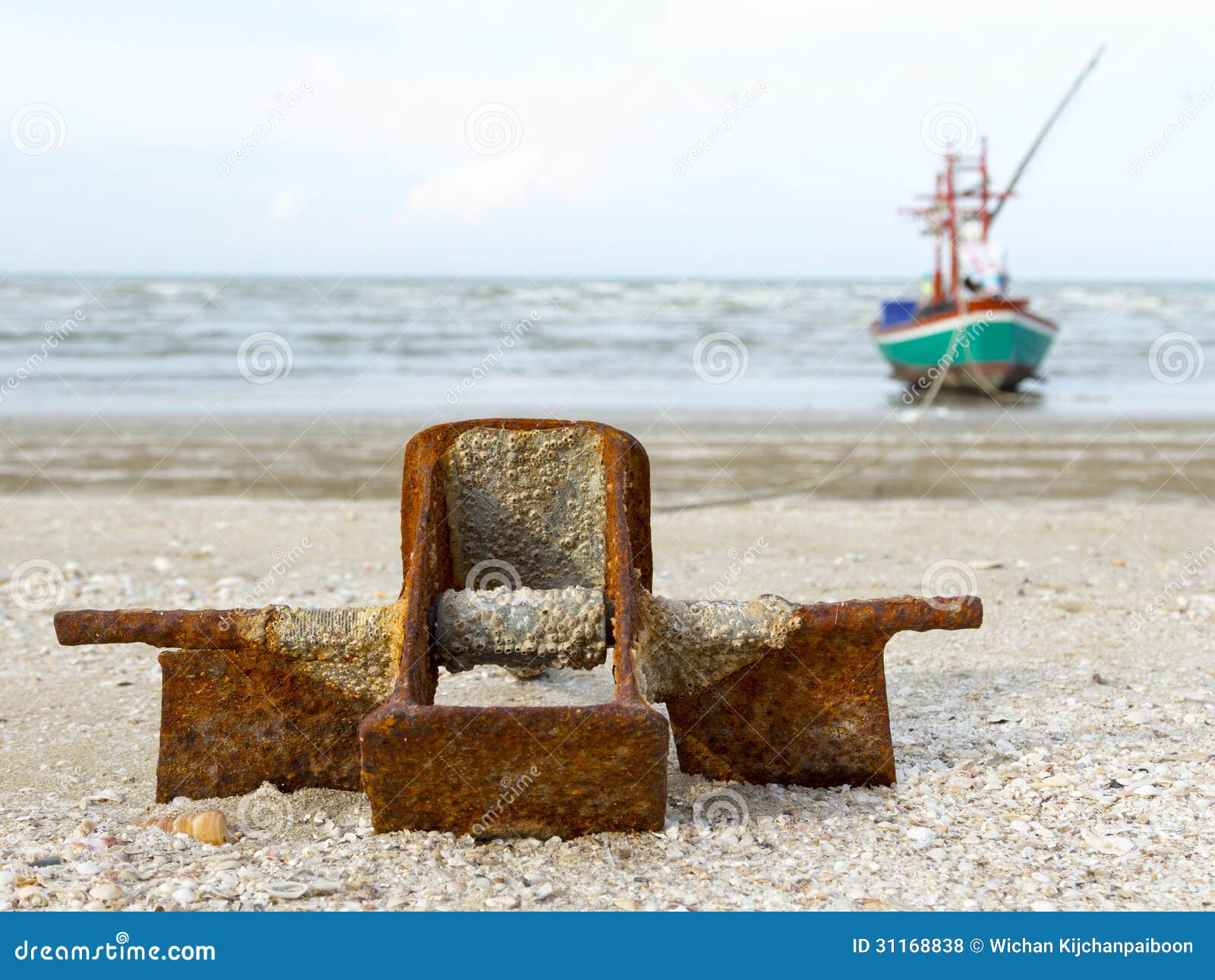 Rust anchor on the beach stock photo. Image of port, rust - 31168838