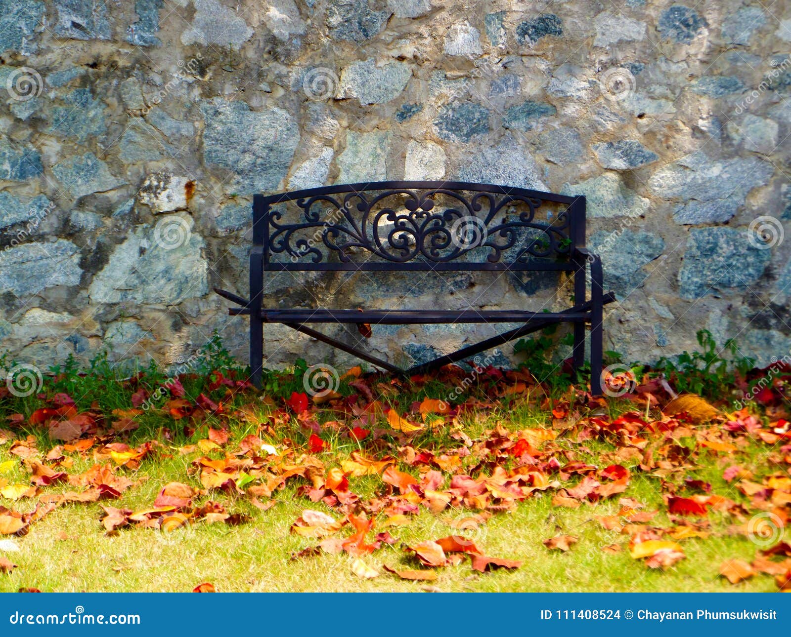 Rust Bench in Garden Granite Stone Wall Stock Photo - Image of ...