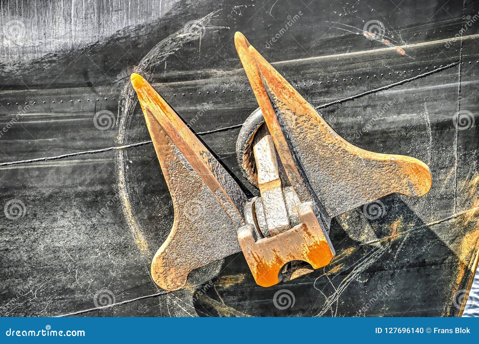 Rust-colored Anchor on a Black Ship Hull Stock Photo - Image of ship ...