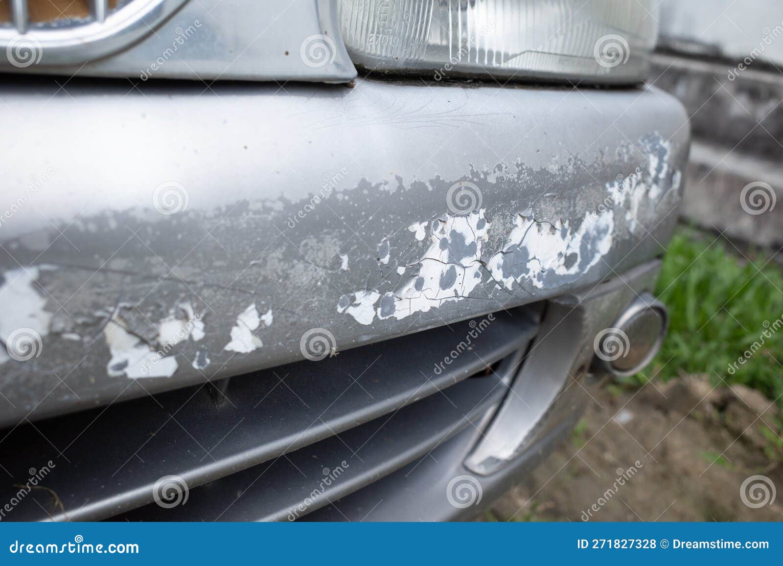 Rust, Grime and Peeling Paint on the Front Bumper of a Car Bonnet after ...