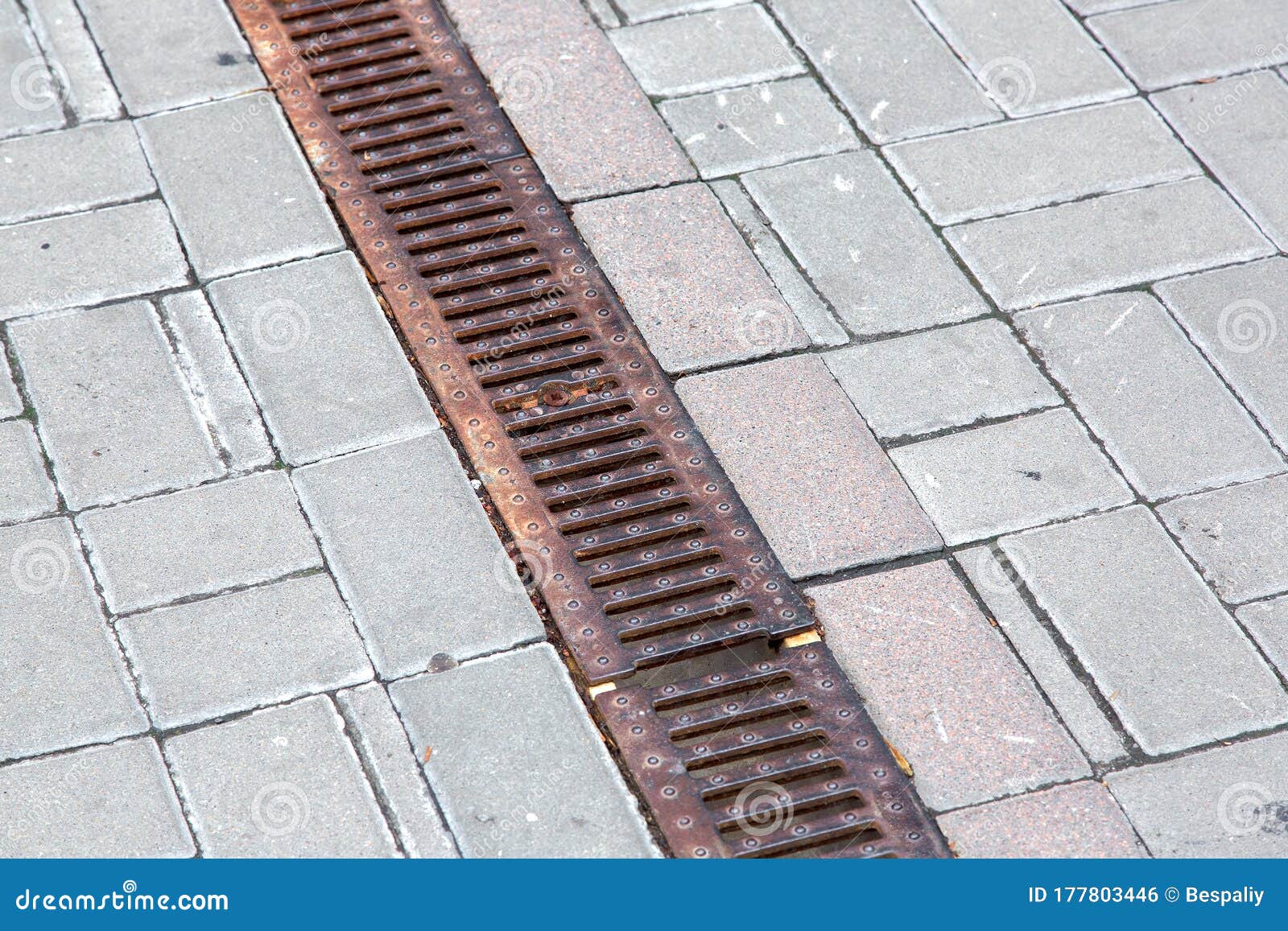 A Rust Lattice of a Drainage Paving System on a Walkway. Stock Photo ...