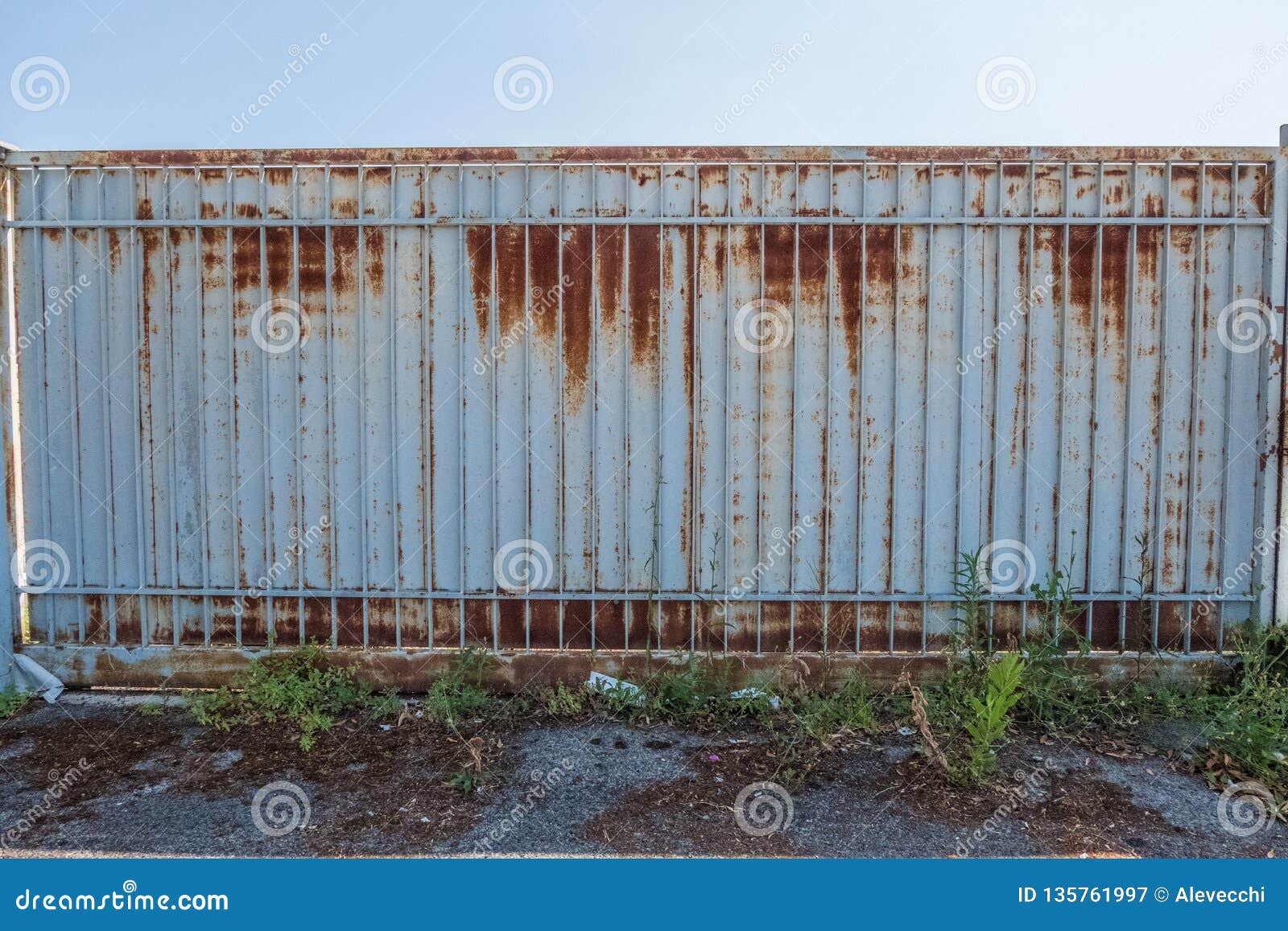Rust on a metallic gate stock image. Image of privacy - 135761997