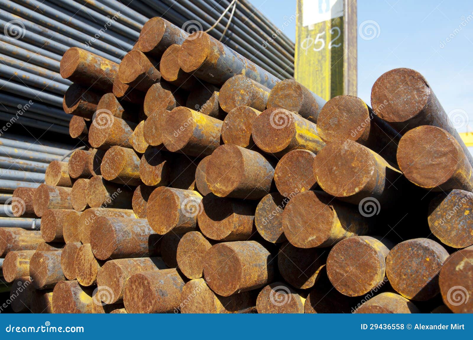 Rust steel rods in raw stock photo. Image of factory - 29436558