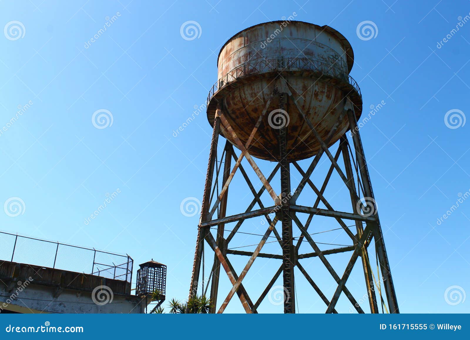 The rust water tower stock image. Image of reserve, reservoir - 161715555