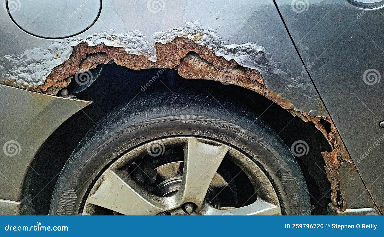 Rust on the wheel arch stock photo. Image of spoke, iron - 259796720