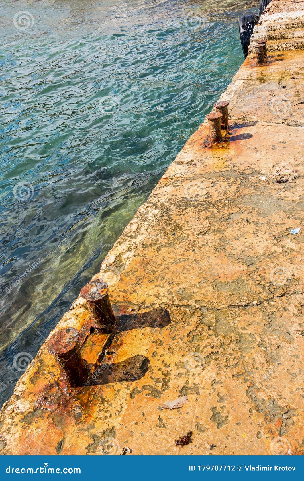 Rusted Bollards on a Concrete Pier Stock Photo - Image of moored ...