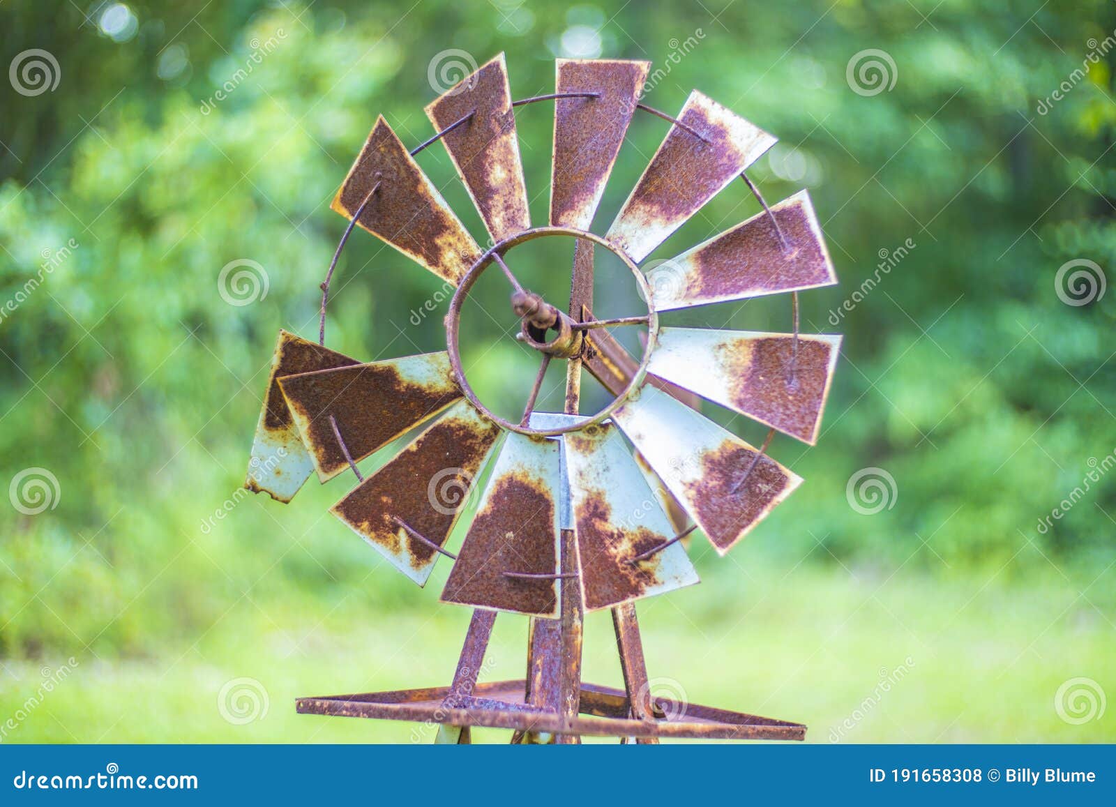 View of a Metal Rusted Windmill Stock Photo - Image of background ...