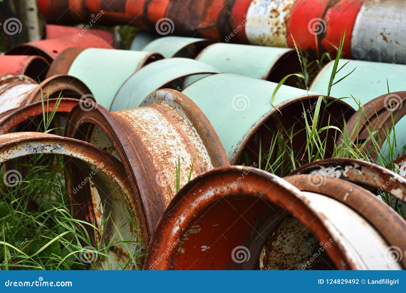 Rusted Old Car Rims and Scrap Metal Stock Photo - Image of container ...