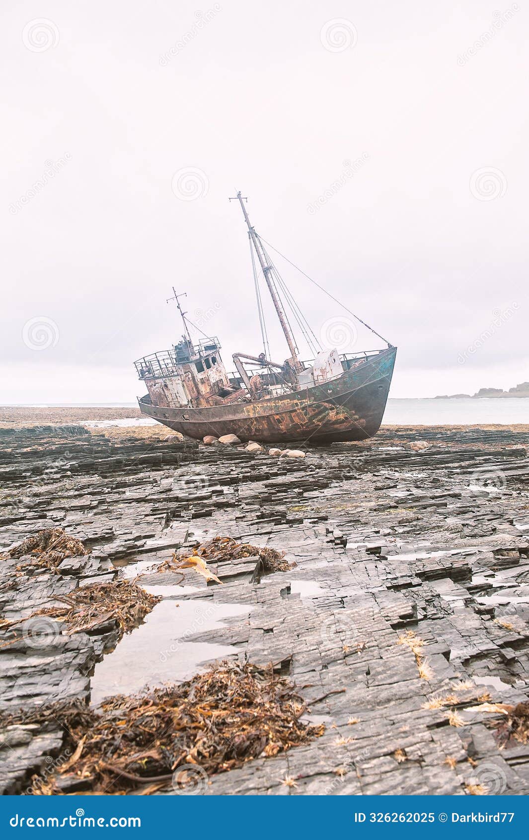 Rusted Shipwreck Lies Abandoned on the Desolate Coast, Highlighting ... Rusted Shipwreck Lies Abandoned on the Desolate Coast, Highlighting ...