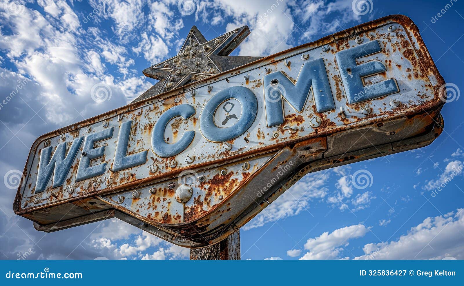 Rusted Sign that Says Welcome. the Sign is Located in a Field with a ...