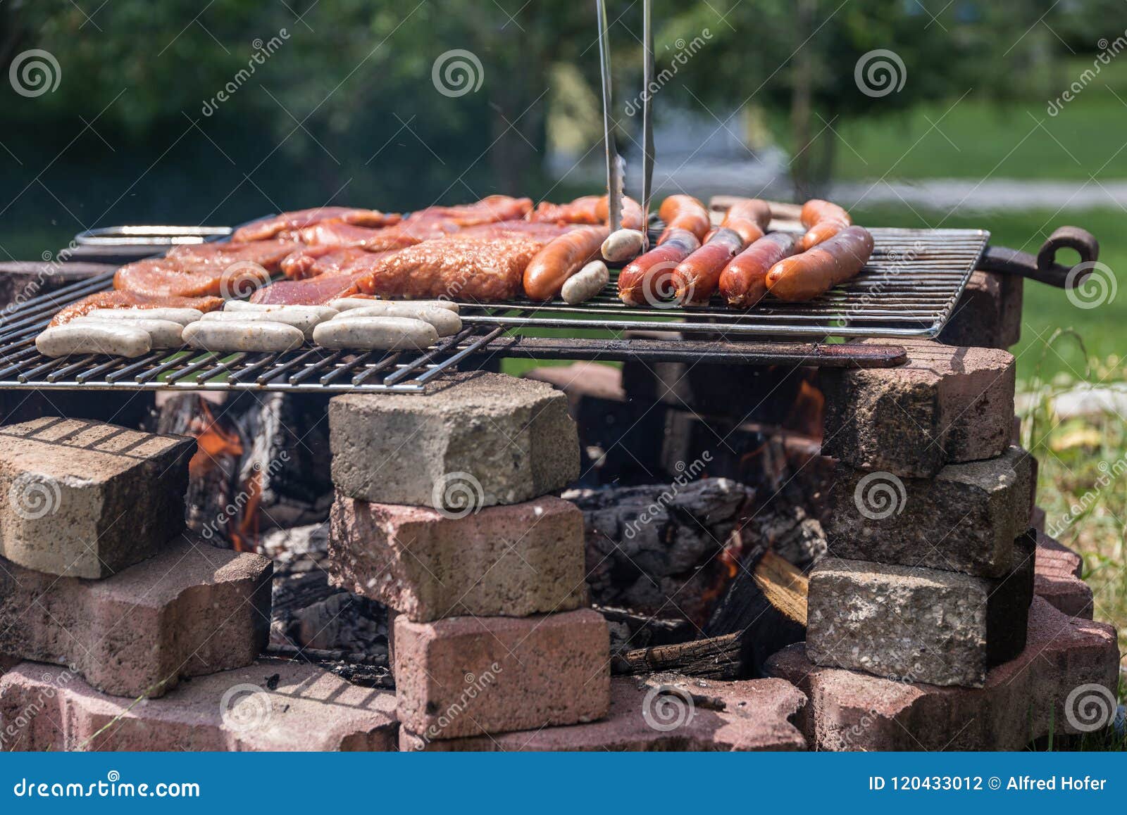 Barbecuing on Outdoor Grill Grate - BBQ Stock Photo - Image of stone ...