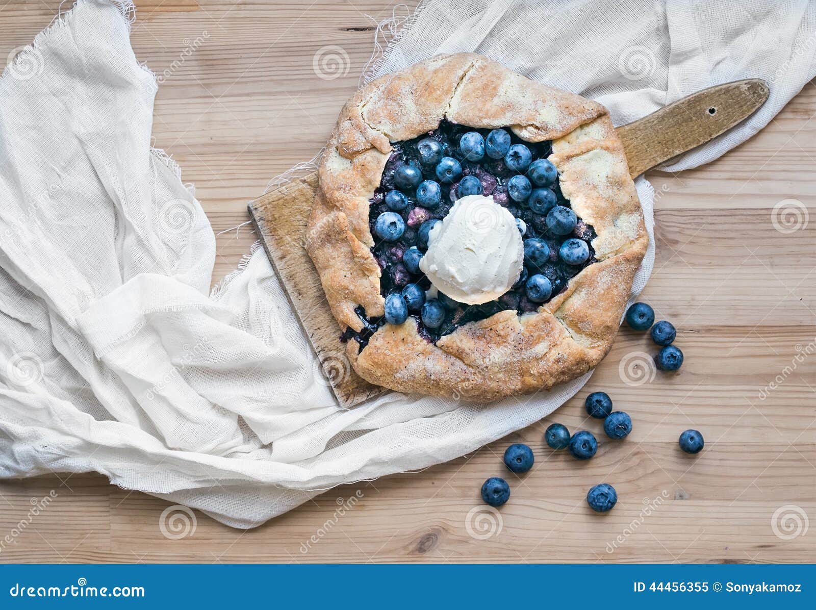 Rustic Blueberry Pie on a Wooden Board and White Tissue Stock Image ...
