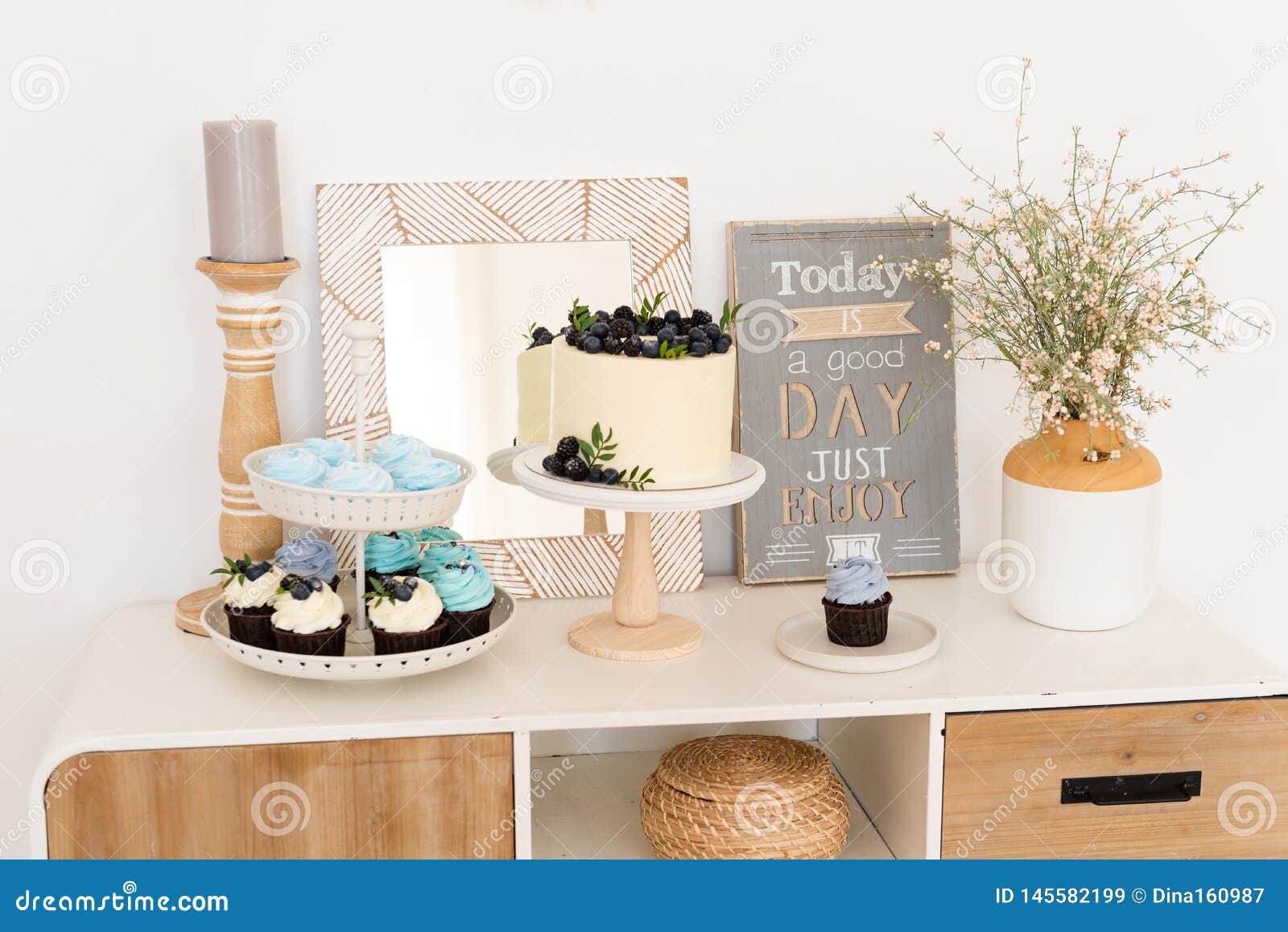 Rustic, Boho Candy Bar. Table with Cake, Cupcakes and Different Sweets ...