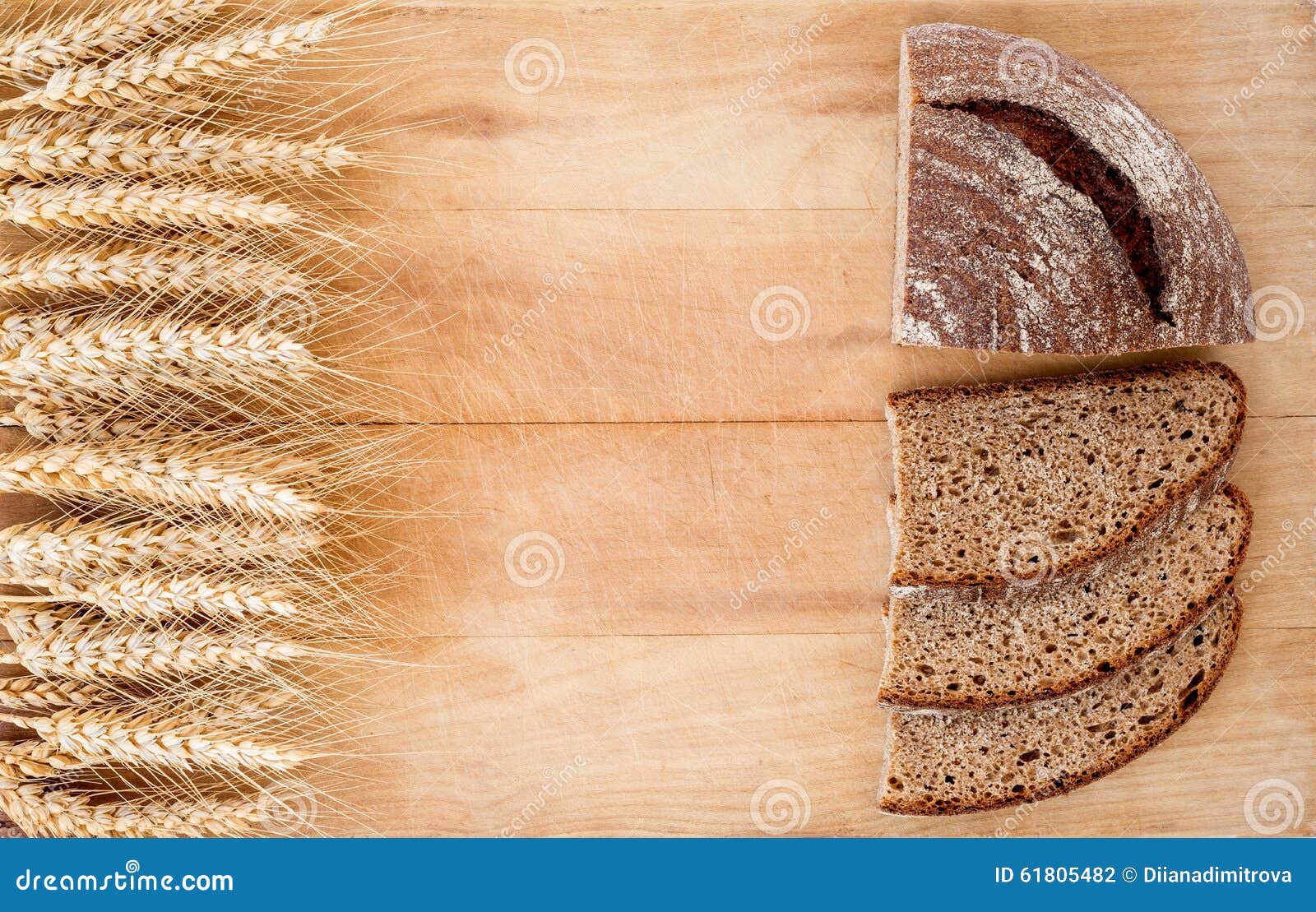 Rustic Bread and Wheat on an Old Vintage Wood Table Stock Photo - Image ...