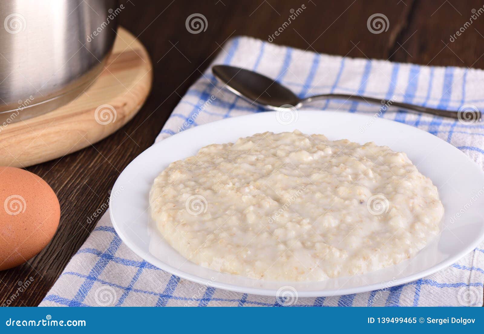 Rustic Breakfast with Freshly Cooked Oatmeal and Boiled Egg Stock Image ...