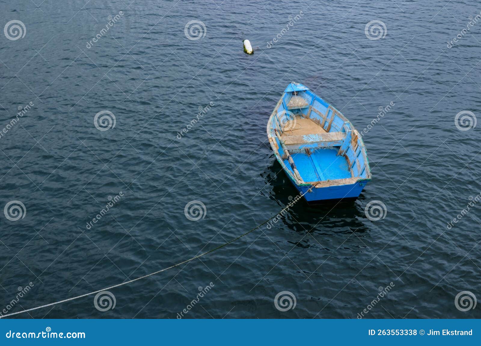 Rustic, Bright Blue Rowboat Anchored at Sea Stock Photo - Image of ...