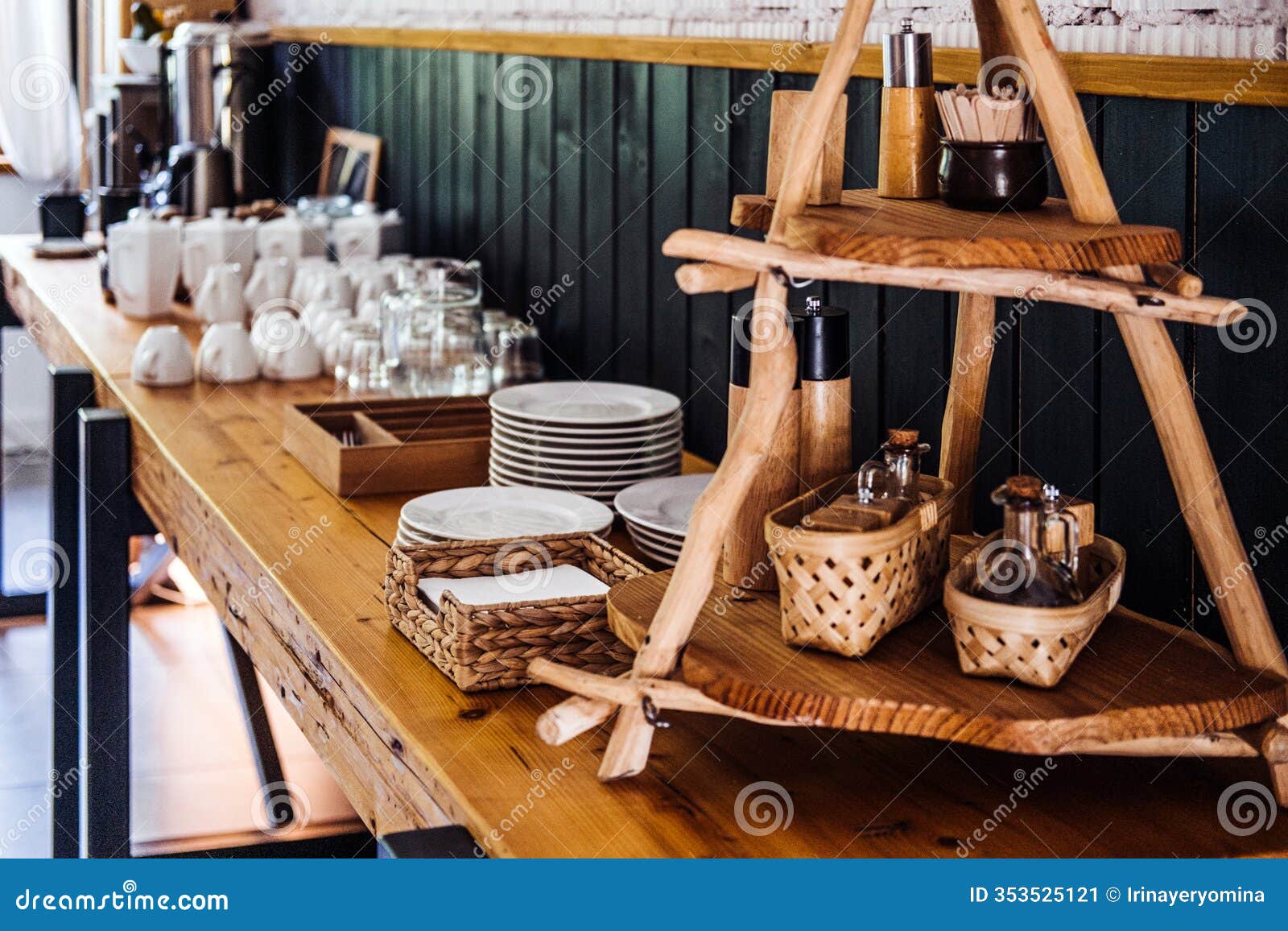 Rustic Buffet Table Setup with Plates, Cups, Glasses, and Wooden ...