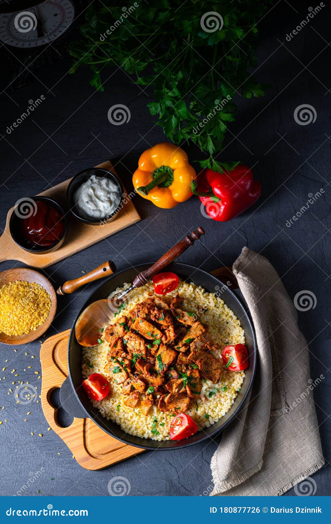 Rustic Bulgur Pans with Gratinated Gyros and Yoghurt Stock Photo ...
