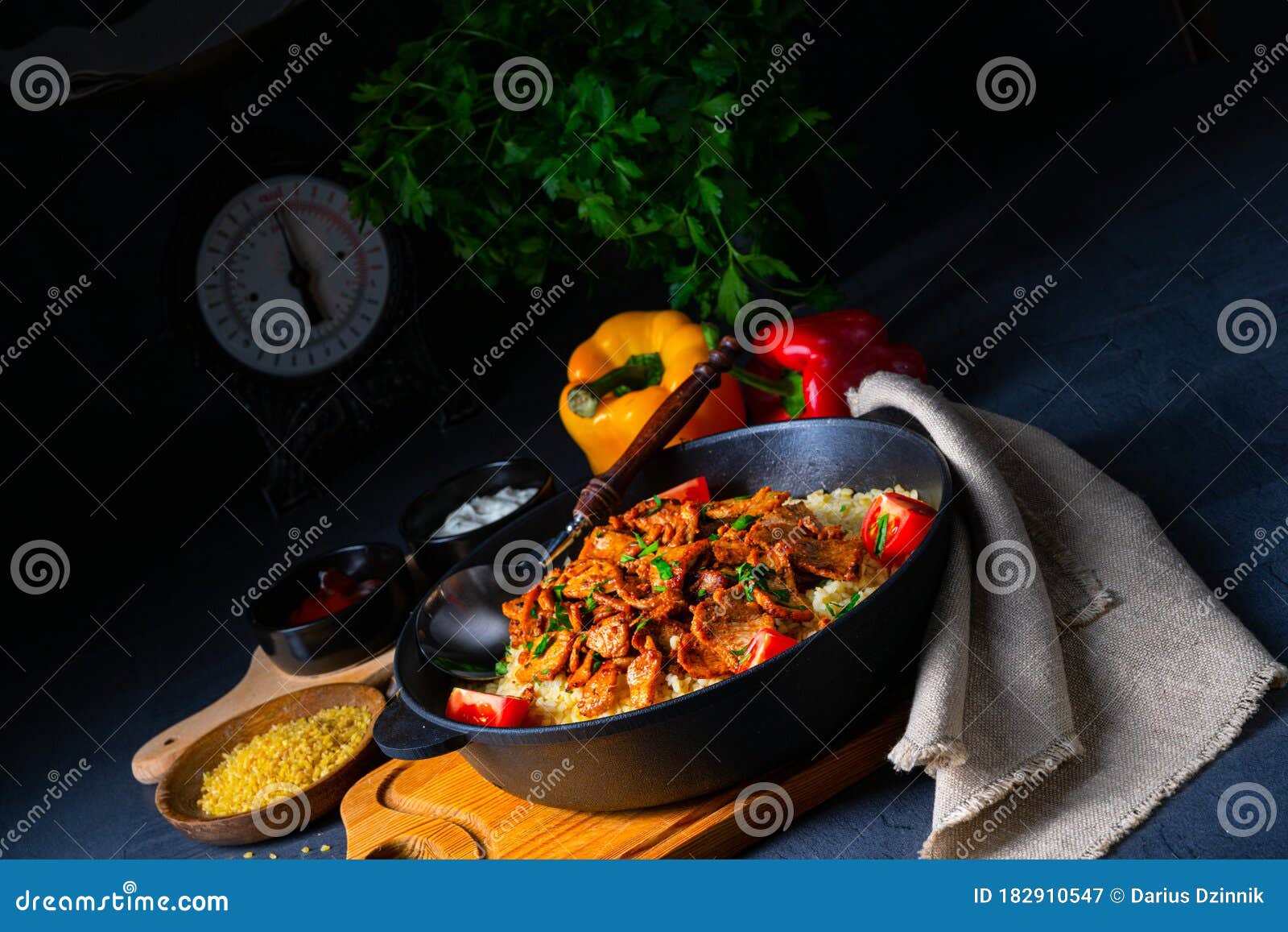 Rustic Bulgur Pans with Gratinated Gyros and Yoghurt Stock Image ...