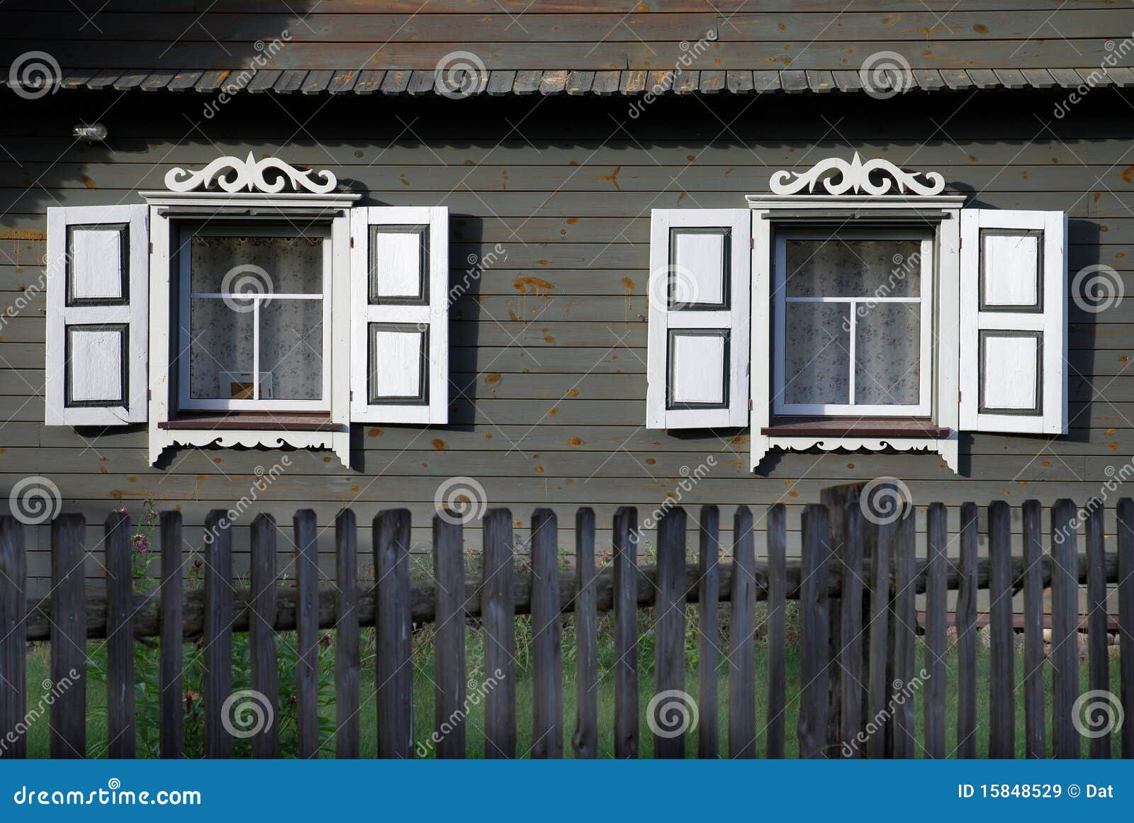 Rustic carved windows stock image. Image of architecture - 15848529