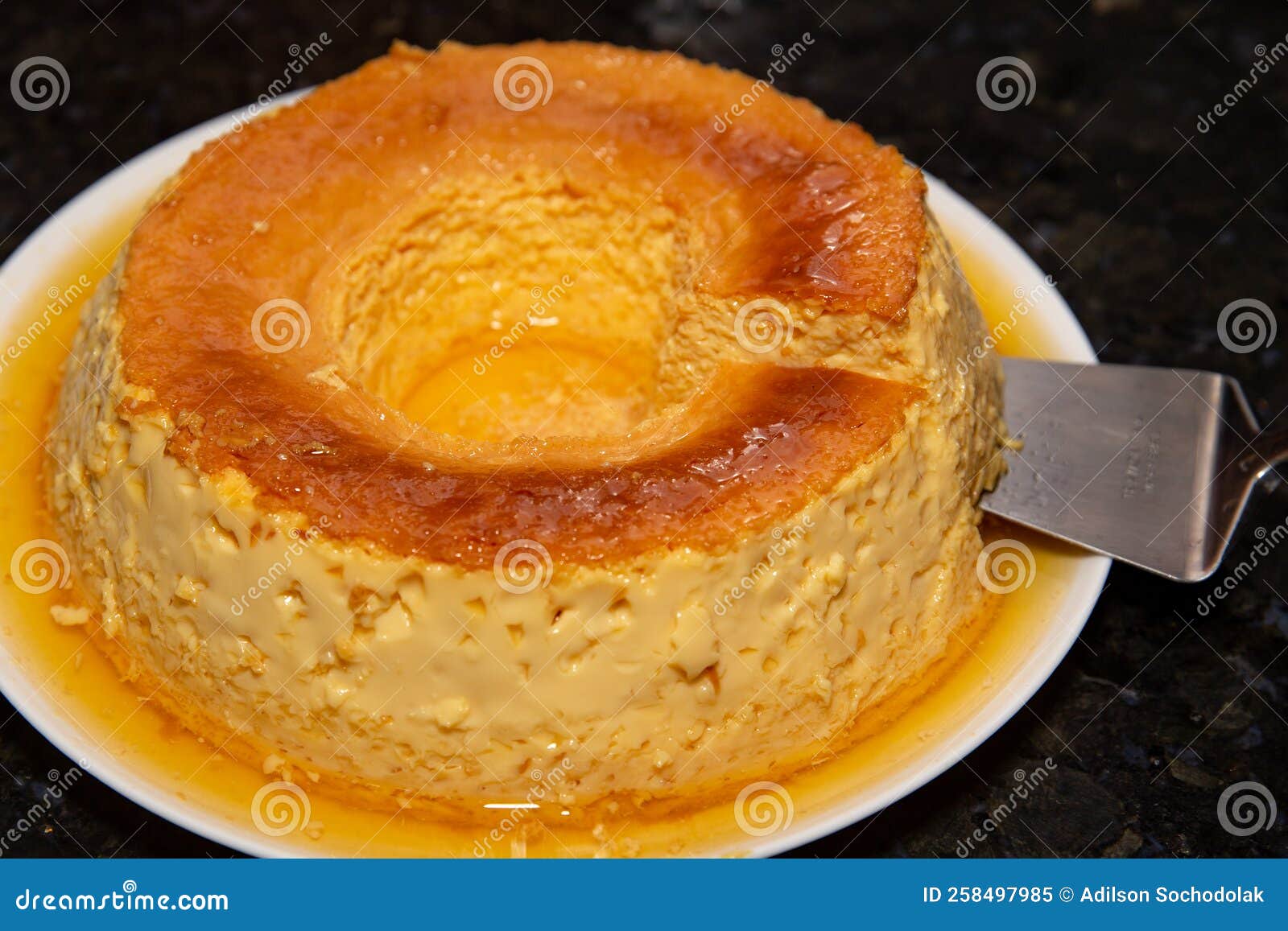 Rustic Condensed Milk Pudding with Eggs and Caramel in Selective Focus ...
